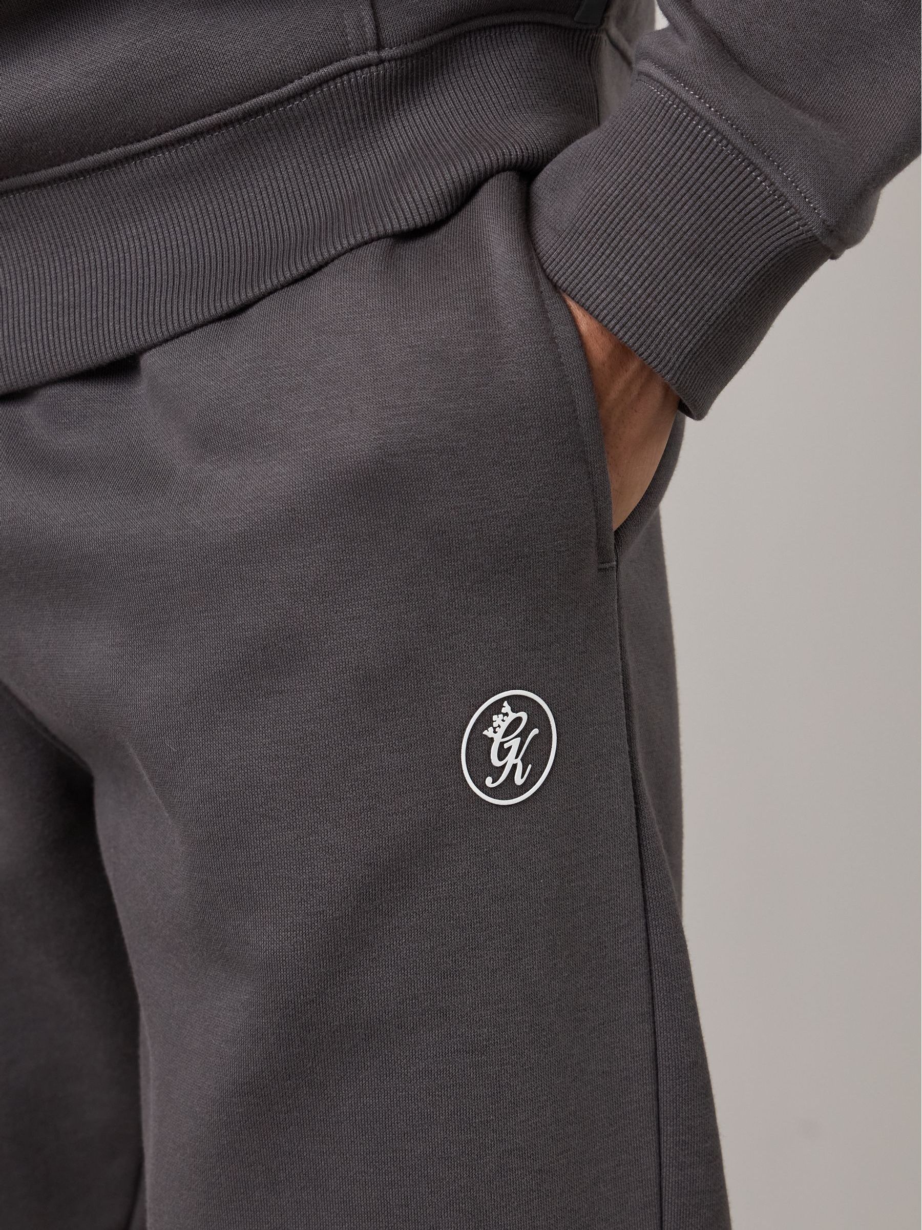 Buy Grey - Gym King Pro Logo Joggers from Next Portugal