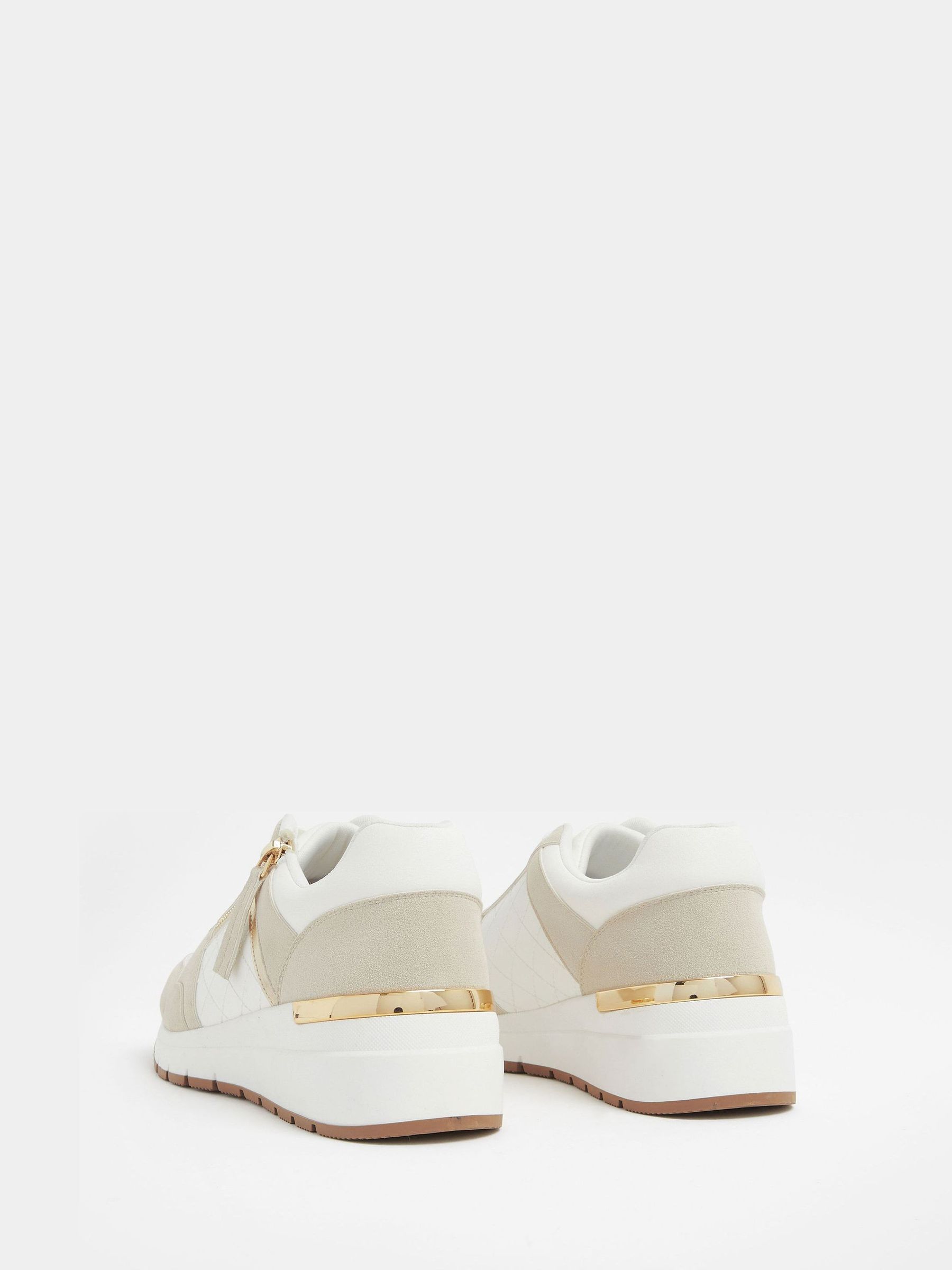 Buy Yours Curve White Wide Fit Quilted Wedge Trainers from the Next UK ...