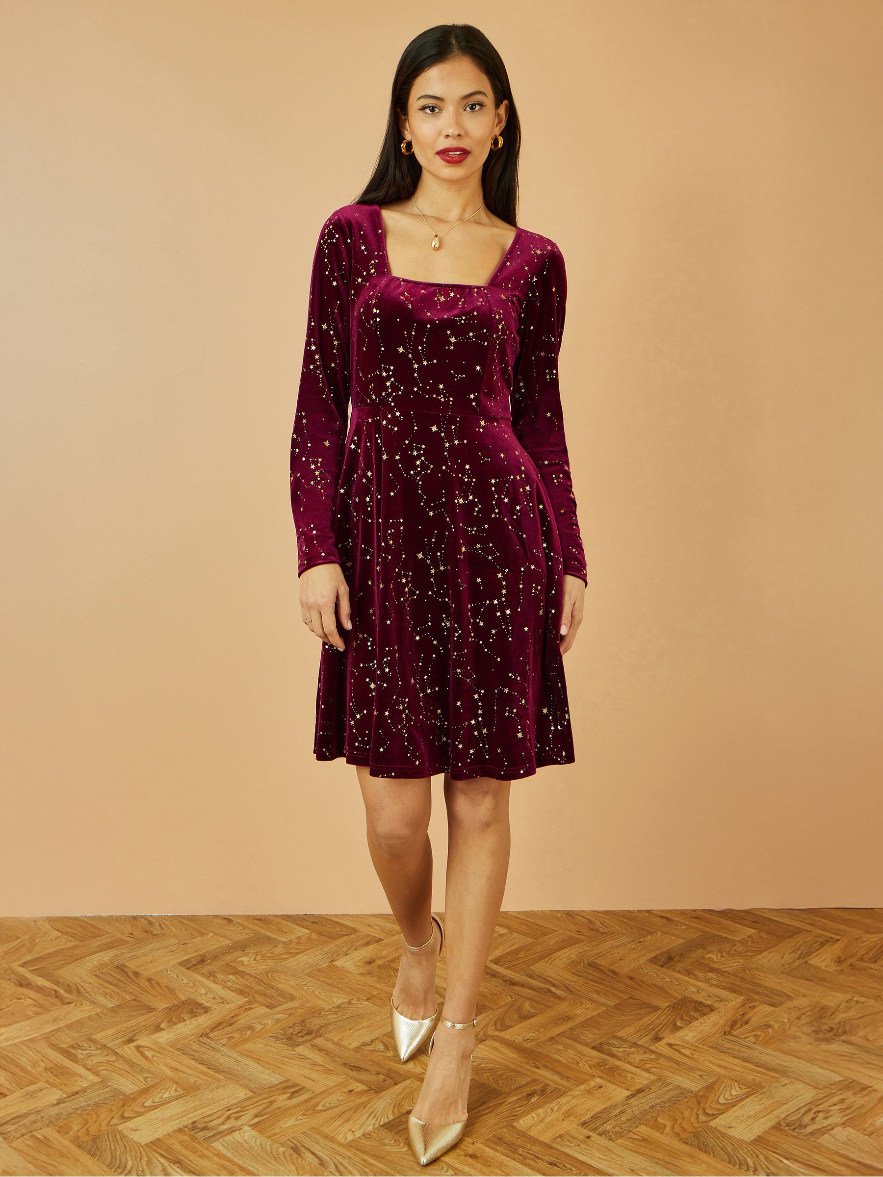 Buy Yumi Red Star Foil Print Long Sleeve Skater Dress from Next Gibraltar