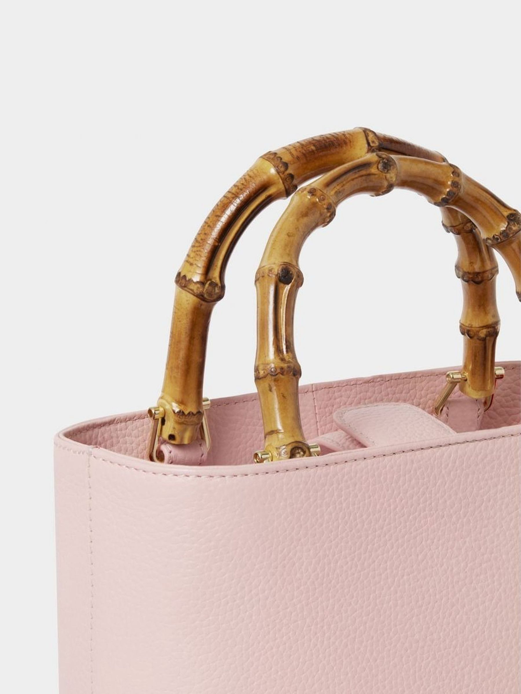 Buy Osprey London Pink Nappa Leather Mini Clio Grab Bag from the Next ...
