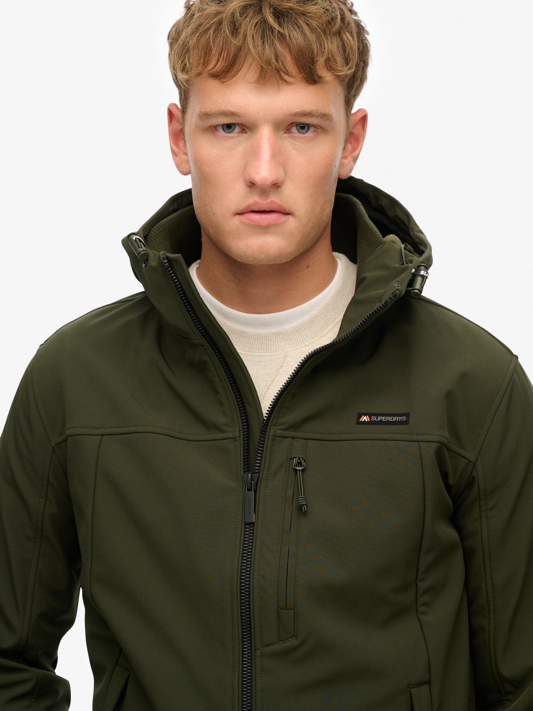 Buy Superdry Green Hooded Soft Shell Trekker Jacket from the Next UK ...