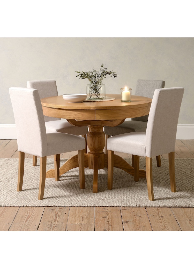 expanding circular dining table uk