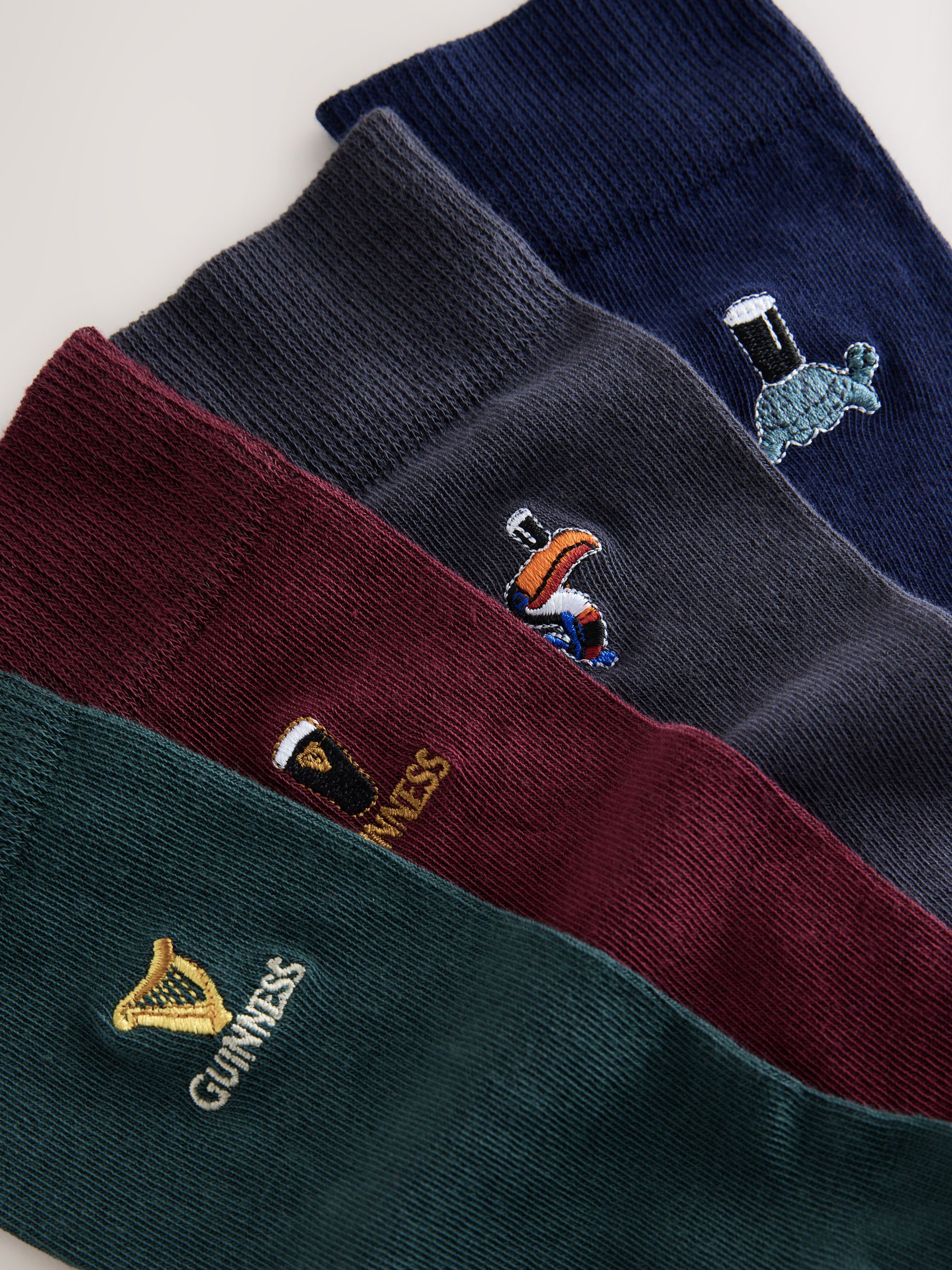 Buy Blue/Green/Red Guinness Embroidered Socks 4 Pack from the Next UK ...