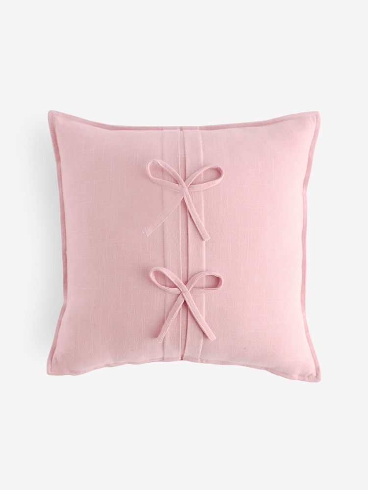 Buy Laura Ashley Pink Sasha Bow Cushion from Next Switzerland