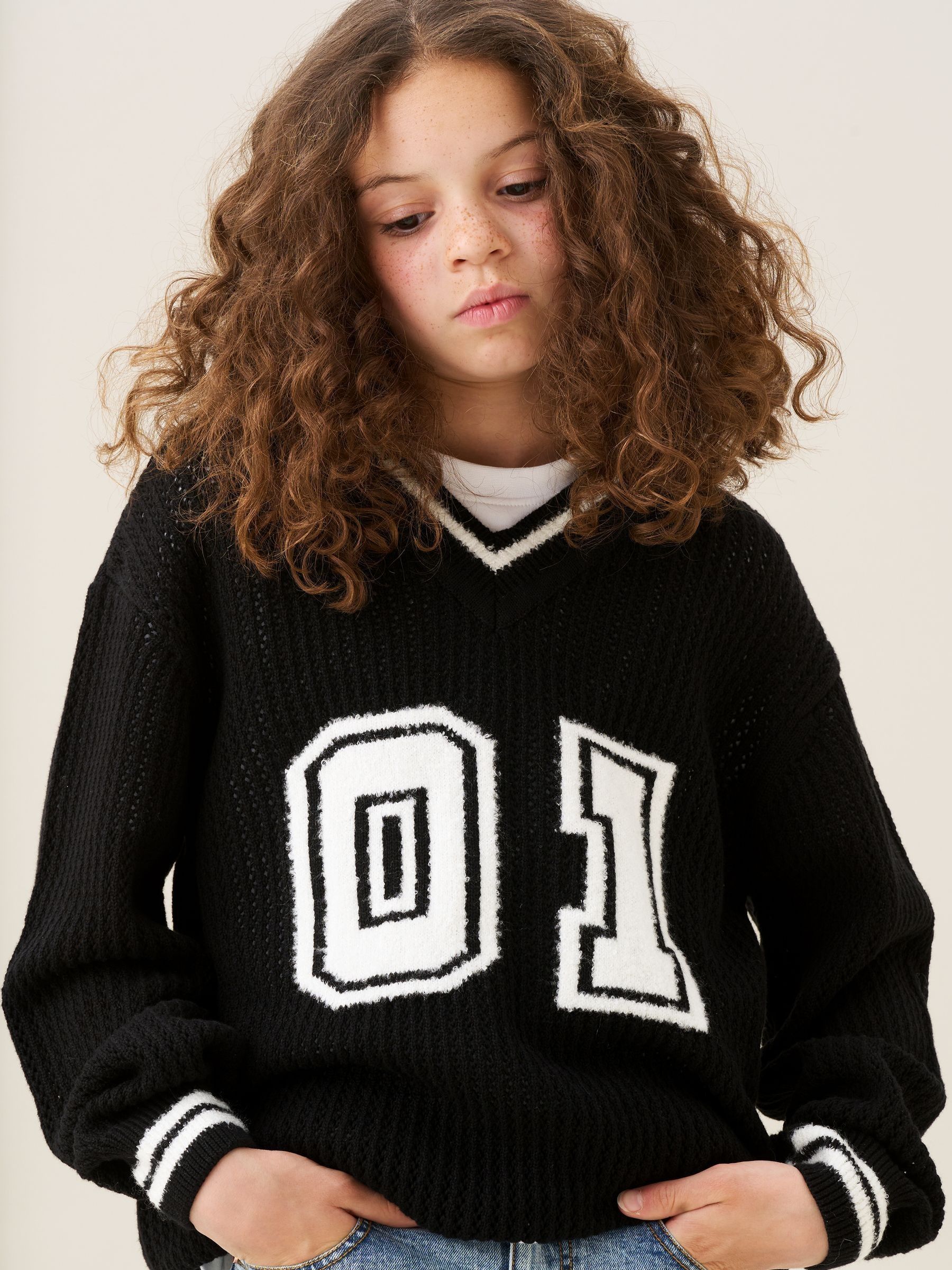 Buy Angel & Rocket Black Reece Varsity Jumper from Next India