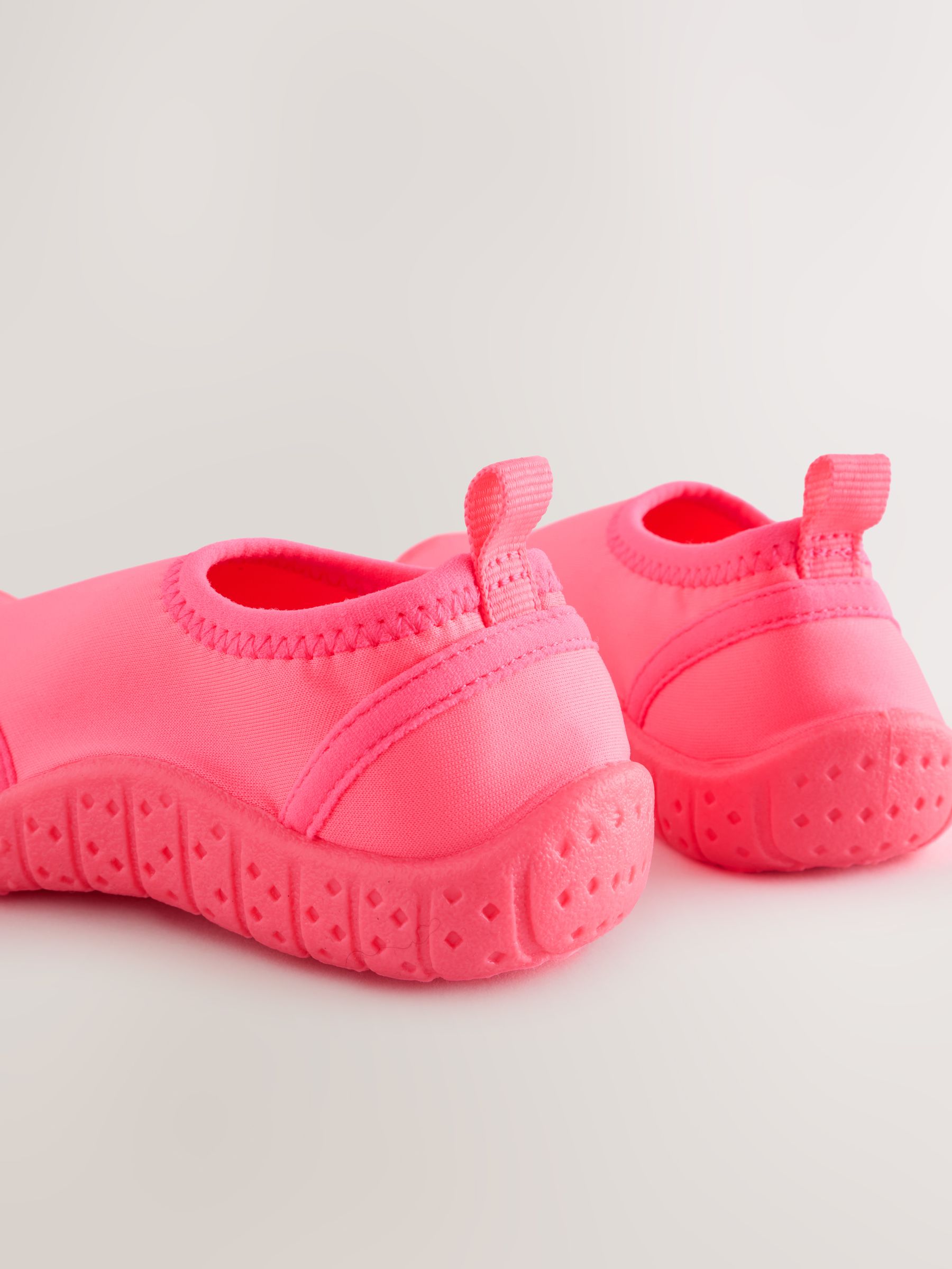 Buy Fluro Pink Swim Socks from the Next UK online shop