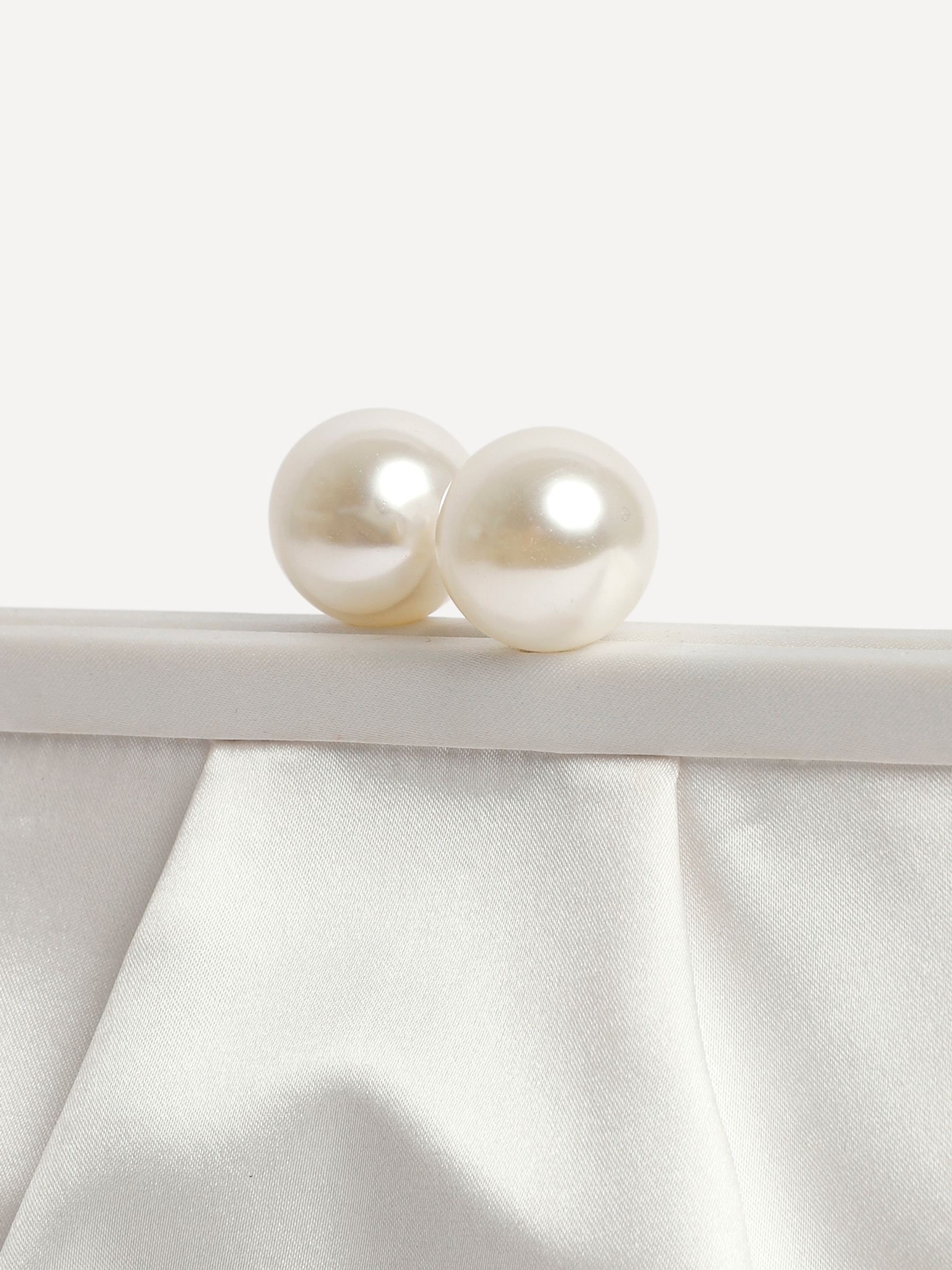 Buy Linzi Cream Rochelle Clutch Bag With Pearl Detail from Next South ...