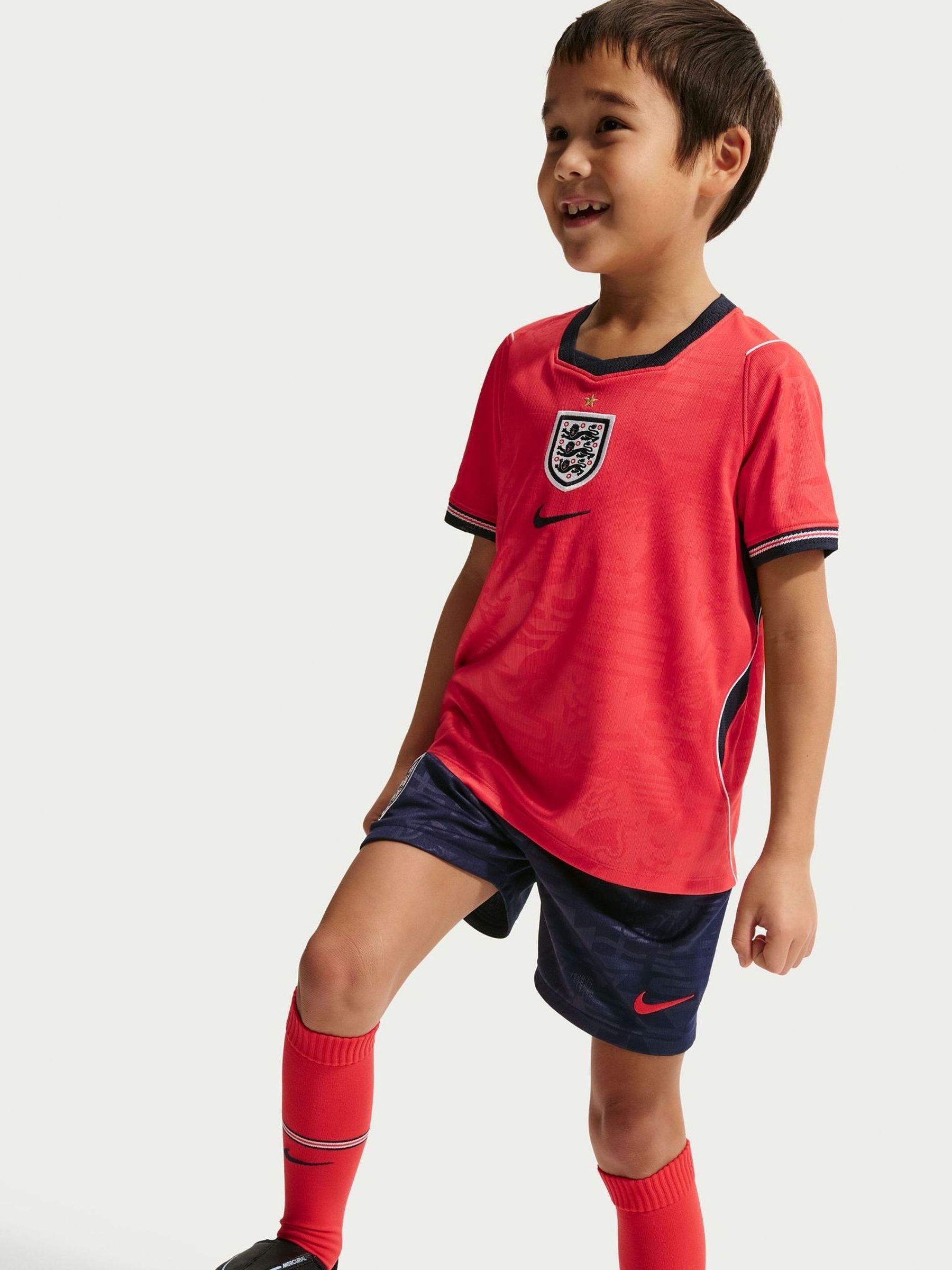 Buy Nike Red England 2026 Little Replica 3-Piece Football Kit from the ...