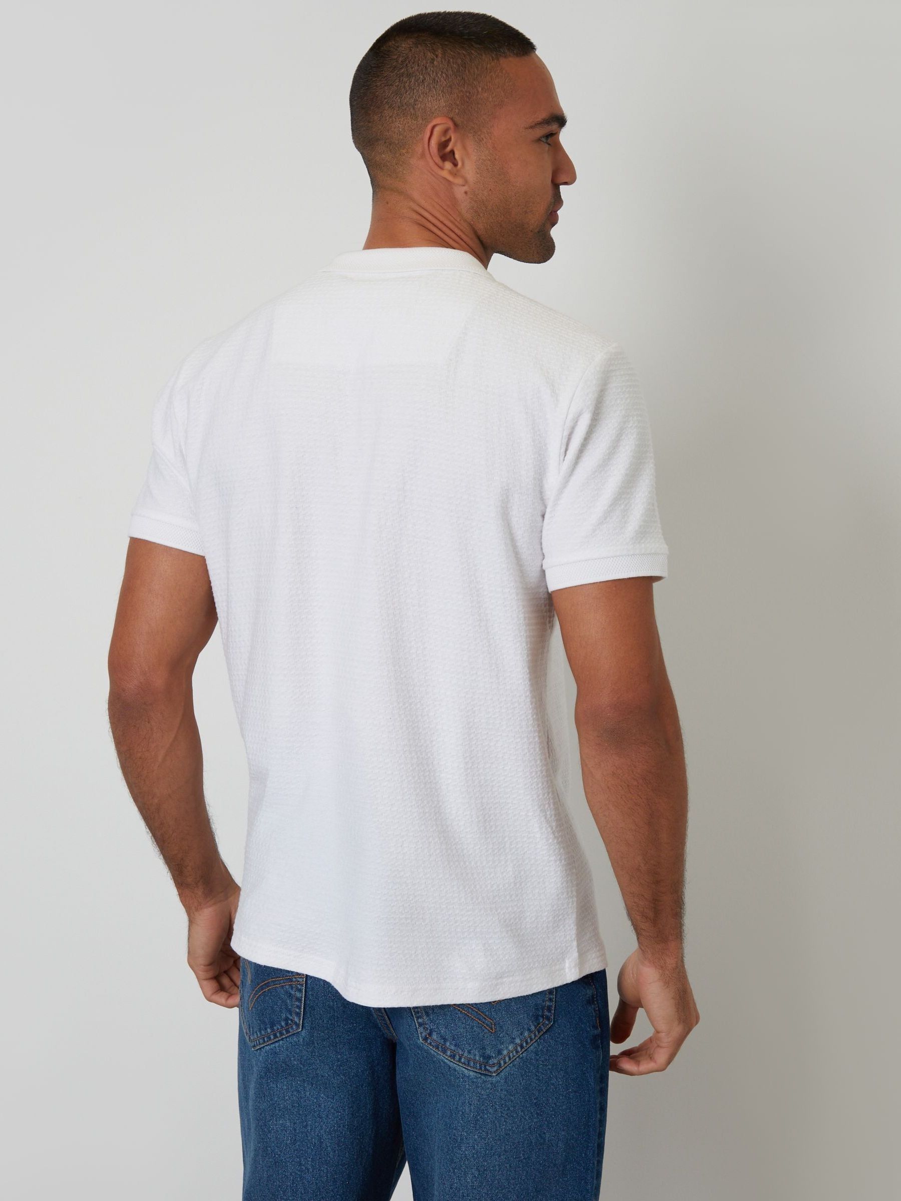Buy Threadbare White Textured Quarter Zip Polo Shirt from Next Switzerland