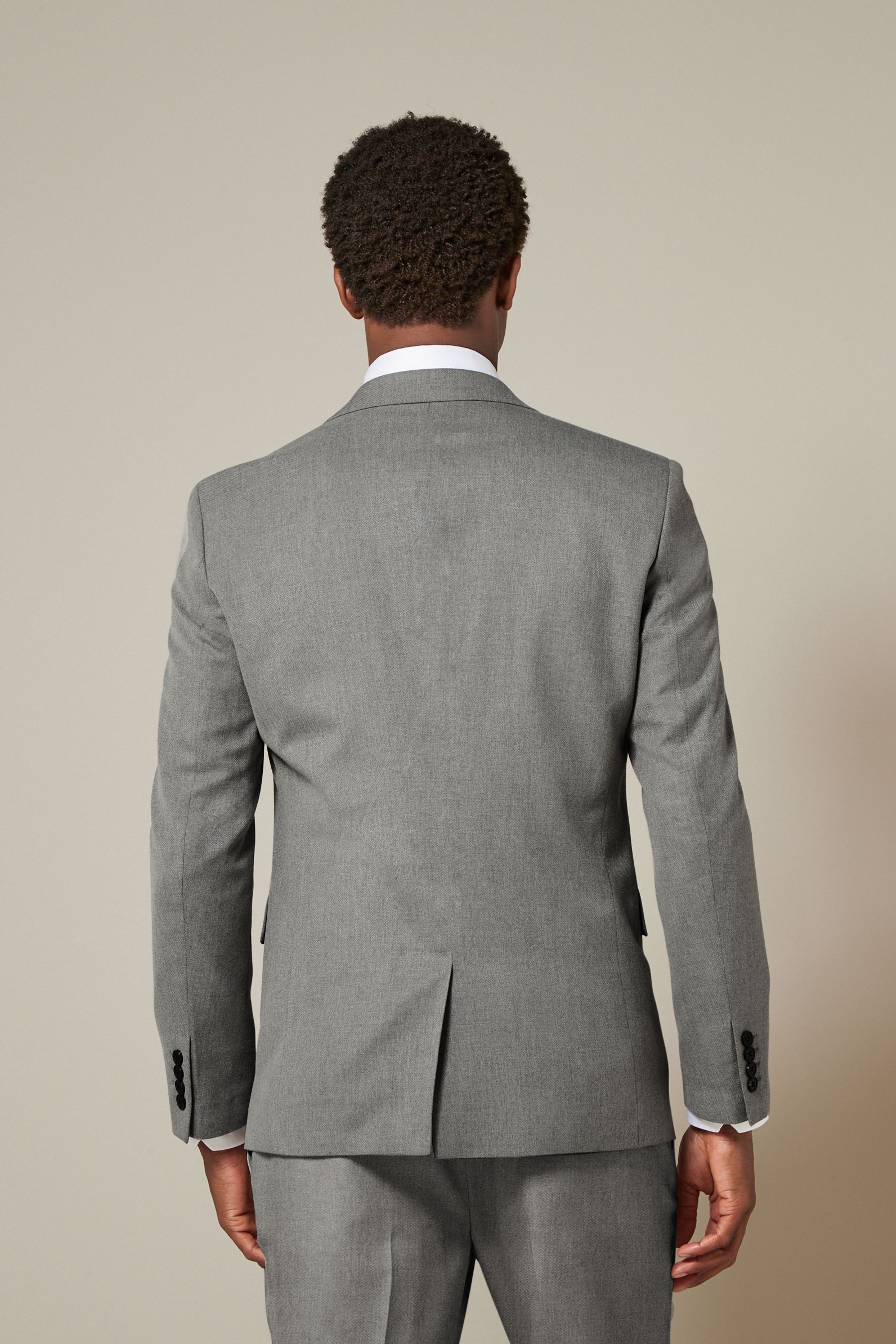 Buy Grey Slim Fit Textured Suit Jacket from the Next UK online shop