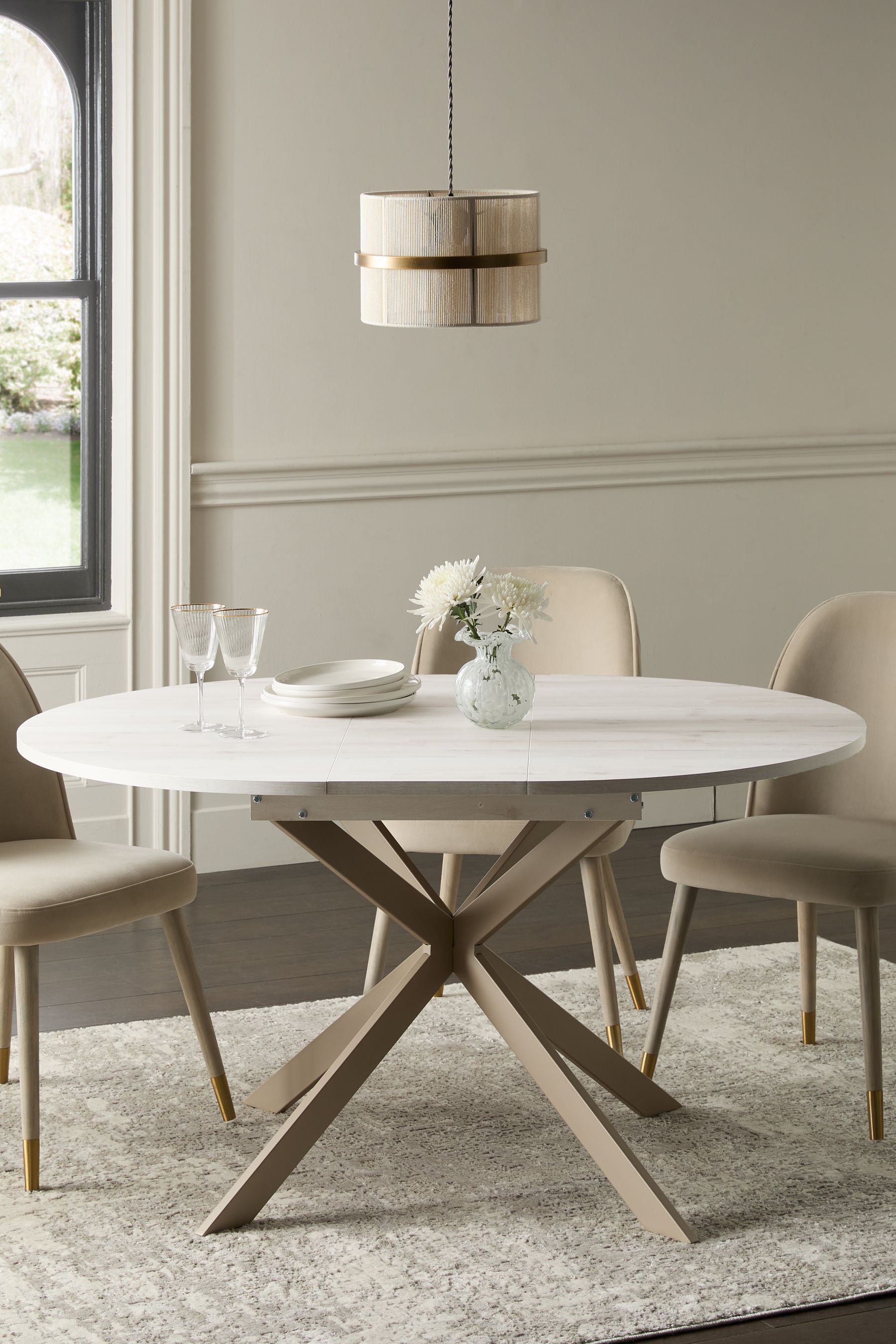 Buy White Bronx Oak Effect Round 4 to 6 Seater Extending Dining Table from the AspennigeriaShops online shop