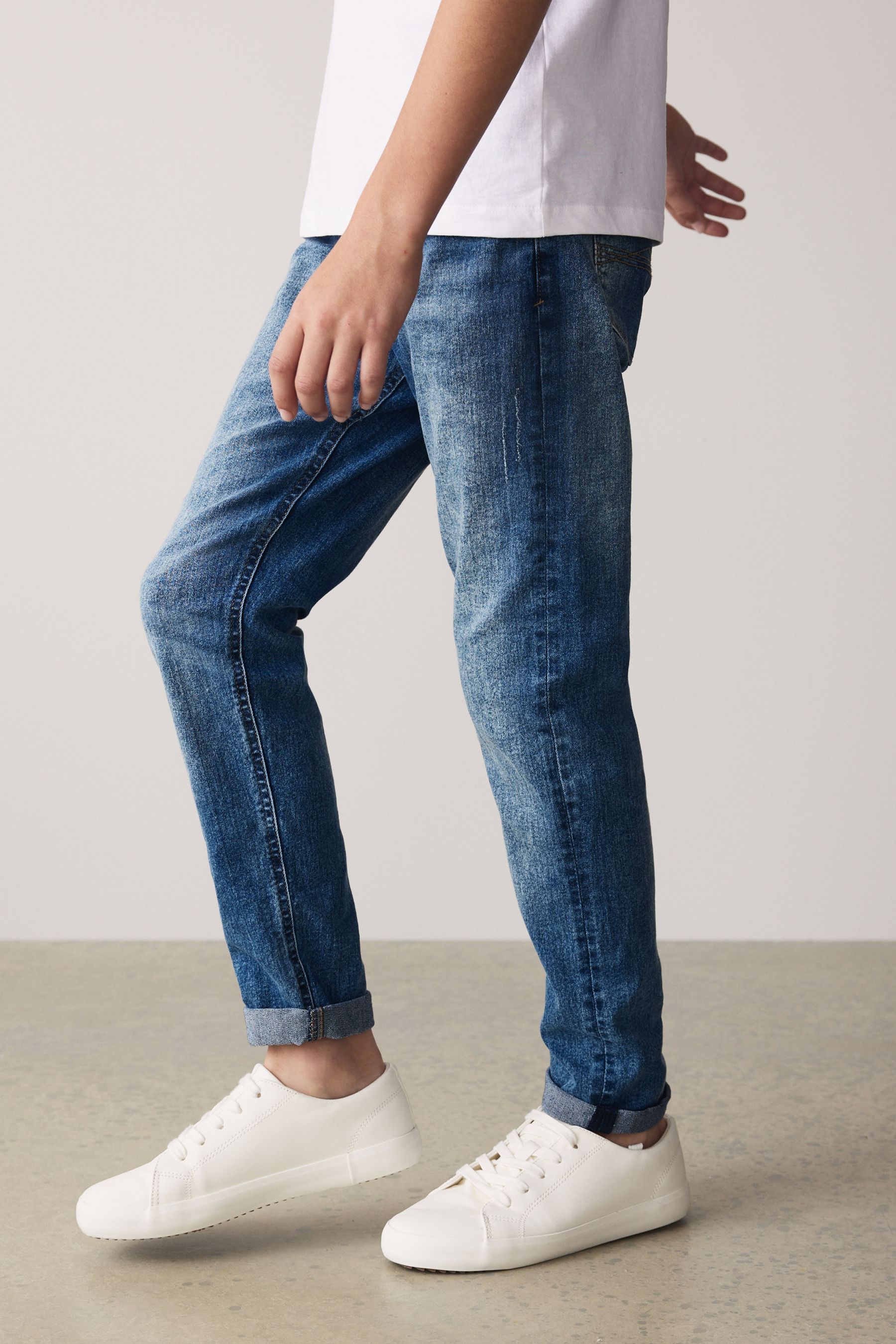 Buy Blue Regular Fit Tapered Fit Stretch Jeans (3-17yrs) from Next ...