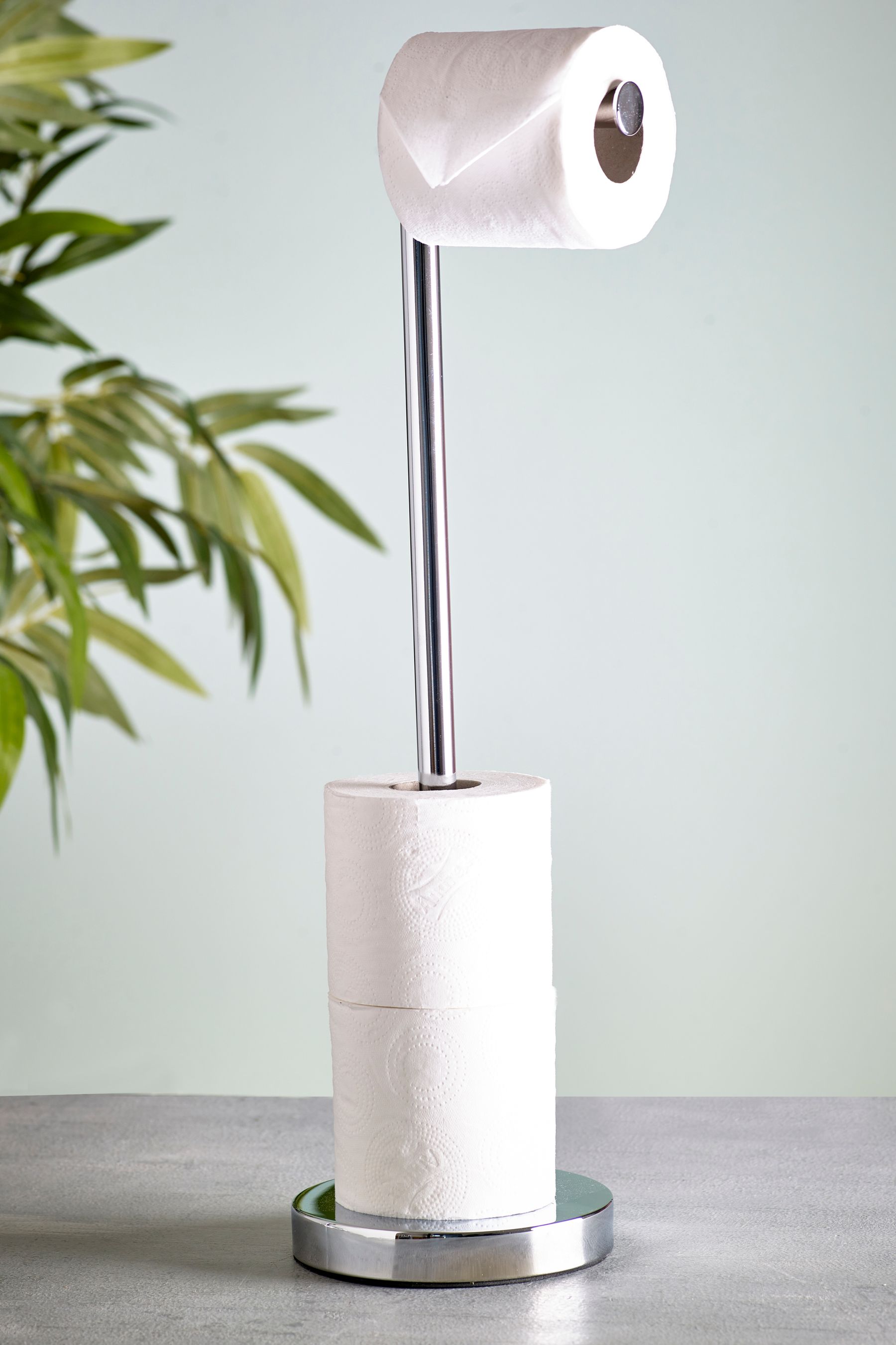Freestanding toilet roll holder next store