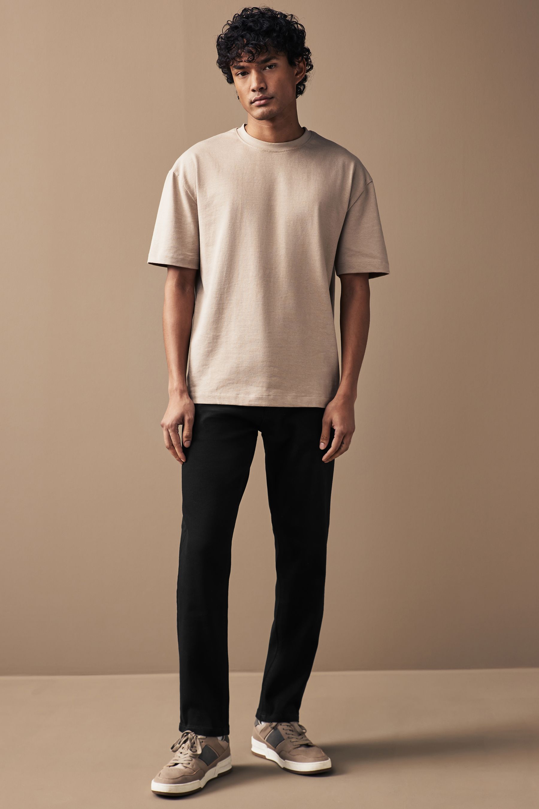 Buy Black Slim Fit Motion Flex Jeans from the Next UK online shop