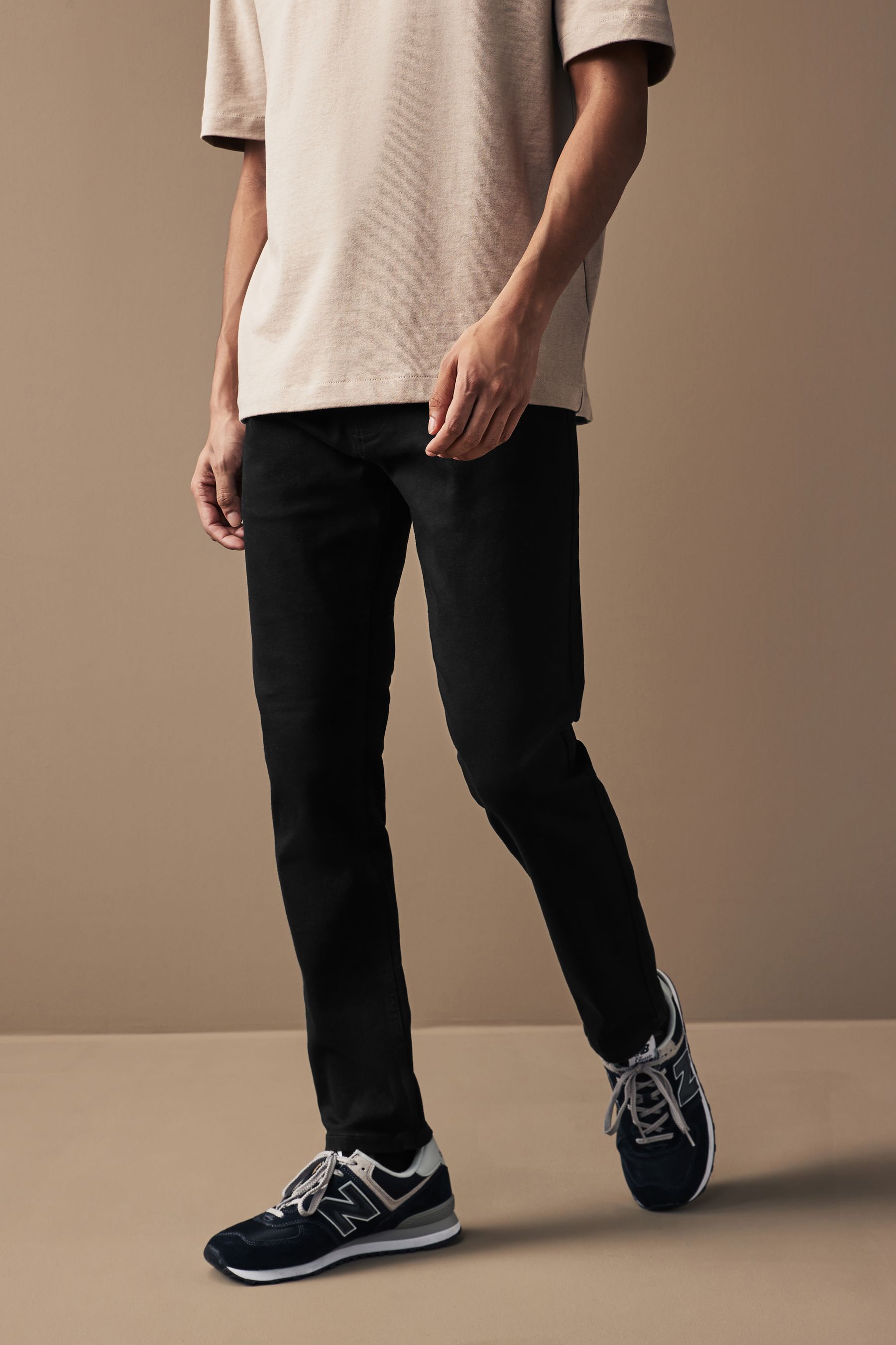 Buy Black Skinny Fit Motion Flex Jeans from the Next UK online shop