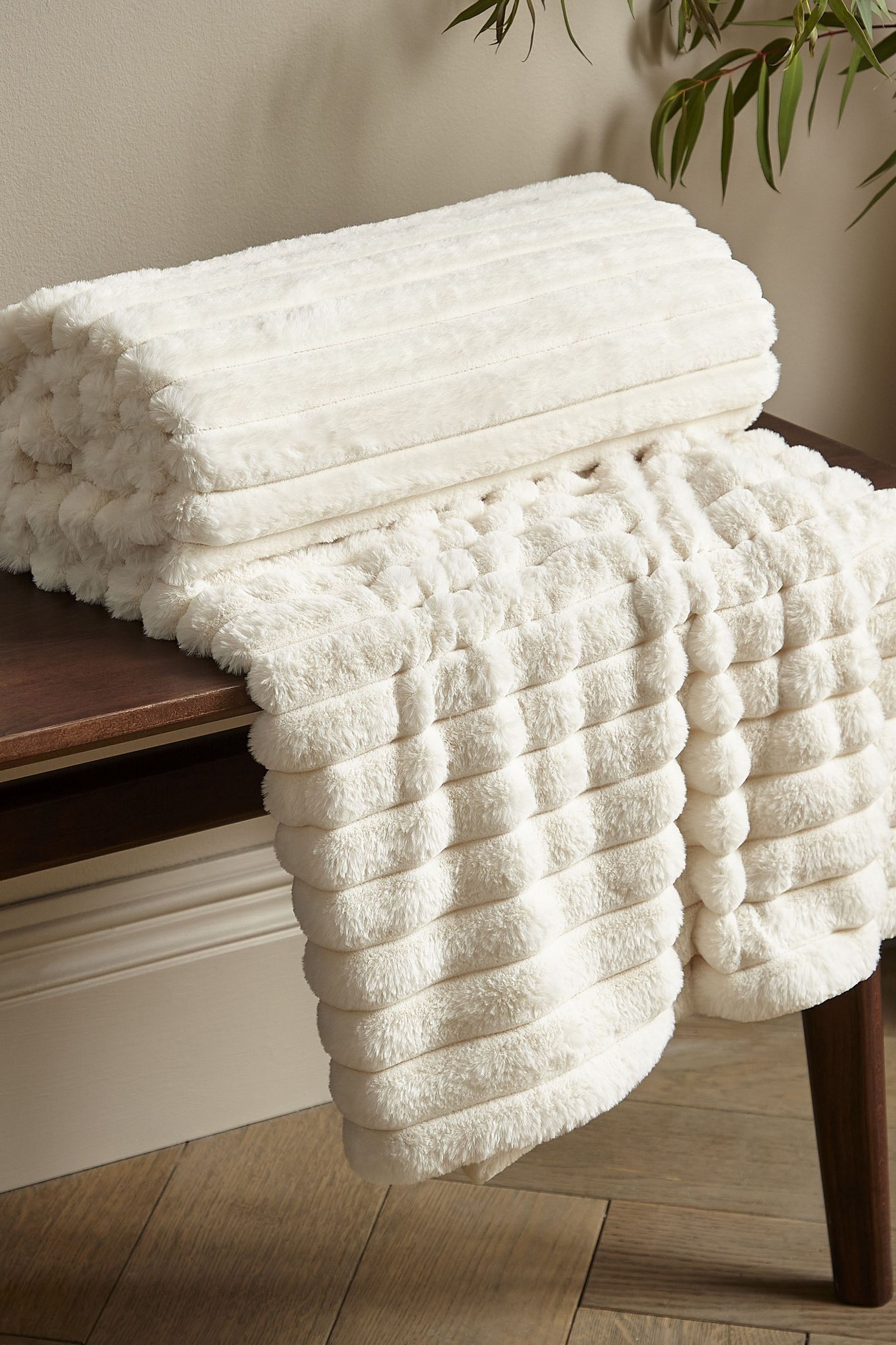 Buy Catherine Lansfield Cream Soft and Cosy Ribbed Faux Fur Throw from ...