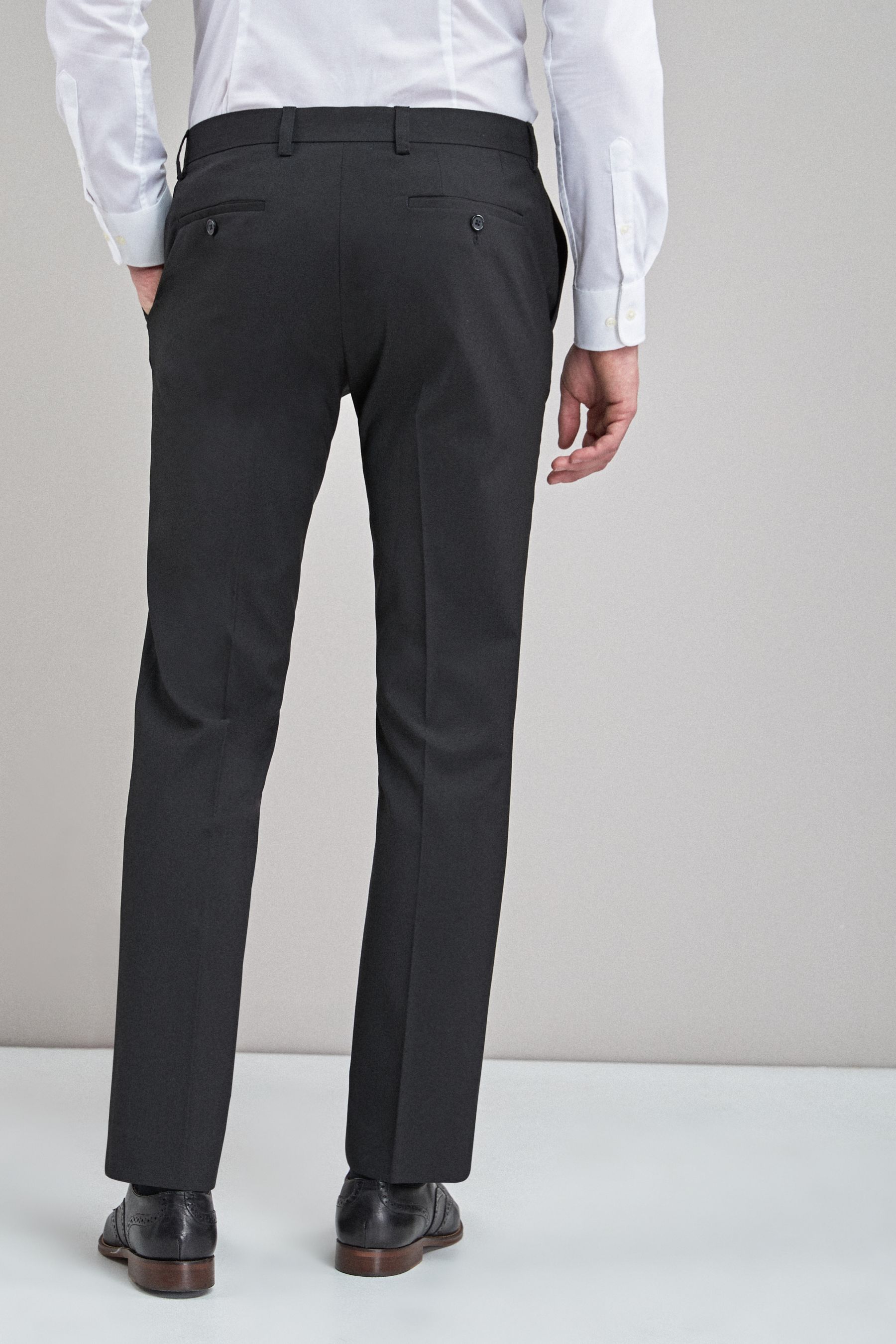 Buy Black Slim Fit Stretch Smart Trousers from the Next UK online shop