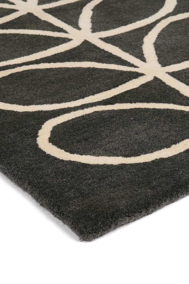 Buy Orla Kiely Brown Linear Stem Geo Wool Rug from Next Ireland