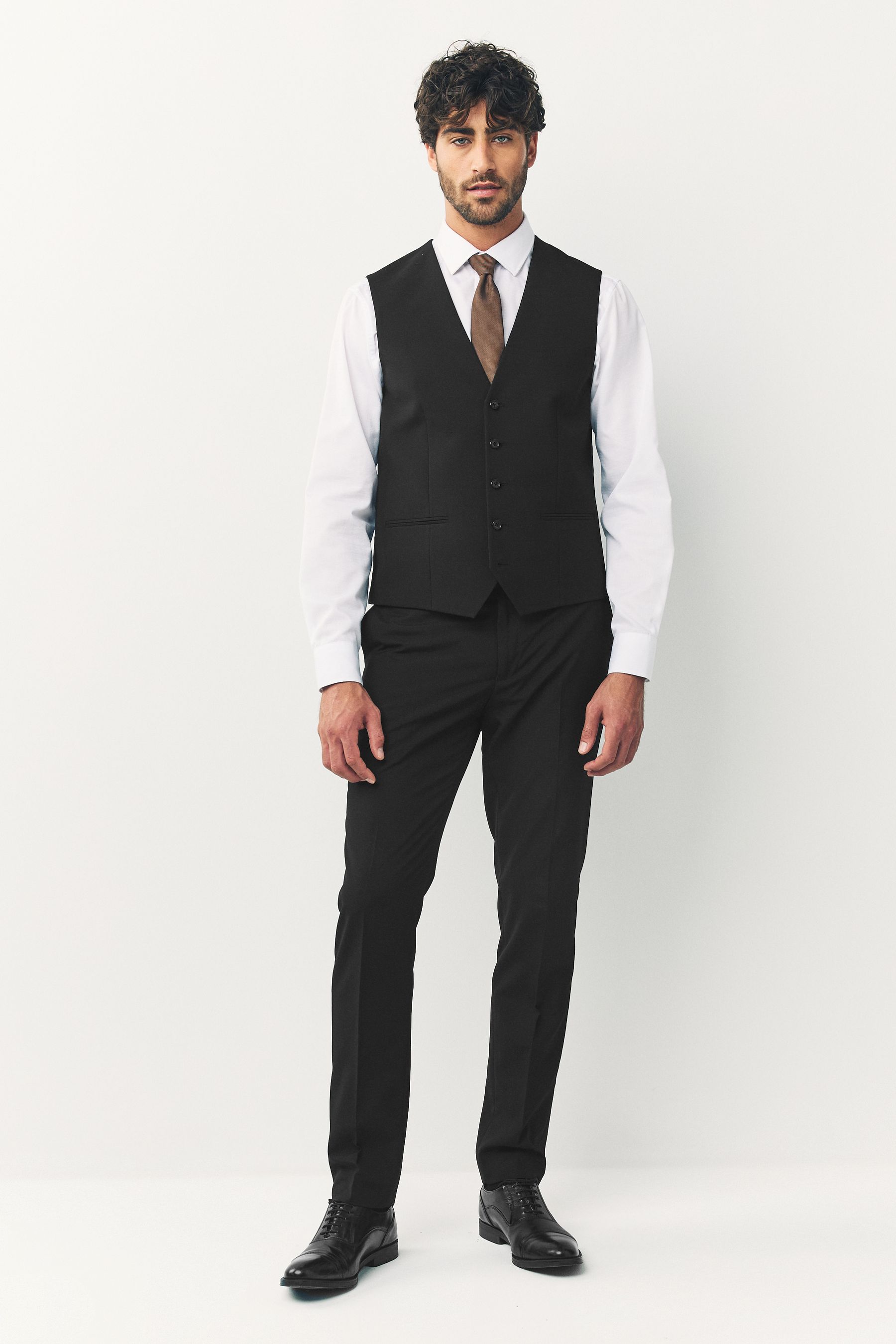 Buy Black Regular Fit Waistcoat from the Next UK online shop
