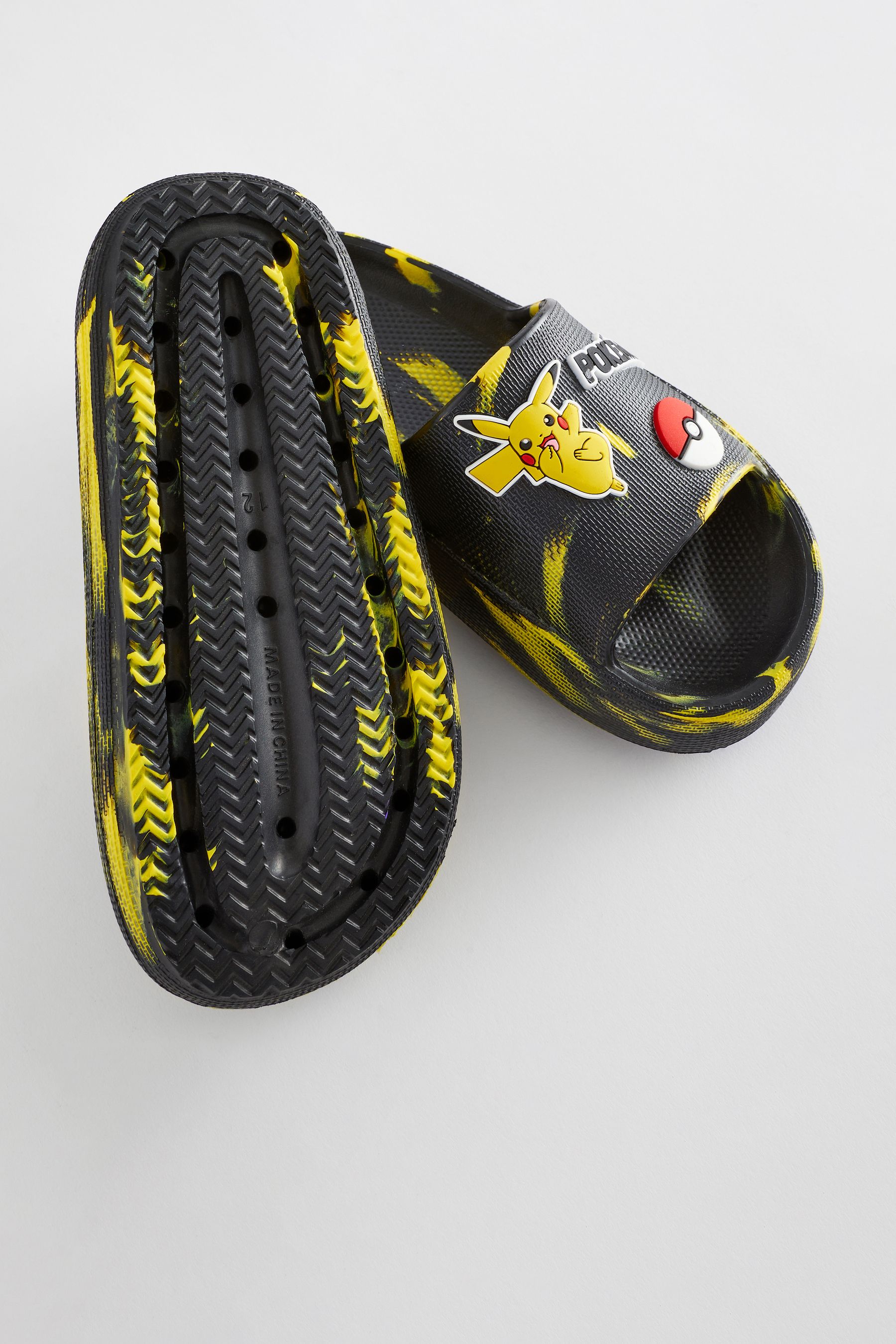 Buy Yellow/Black Pokémon Chunky Sliders from the Next UK online shop