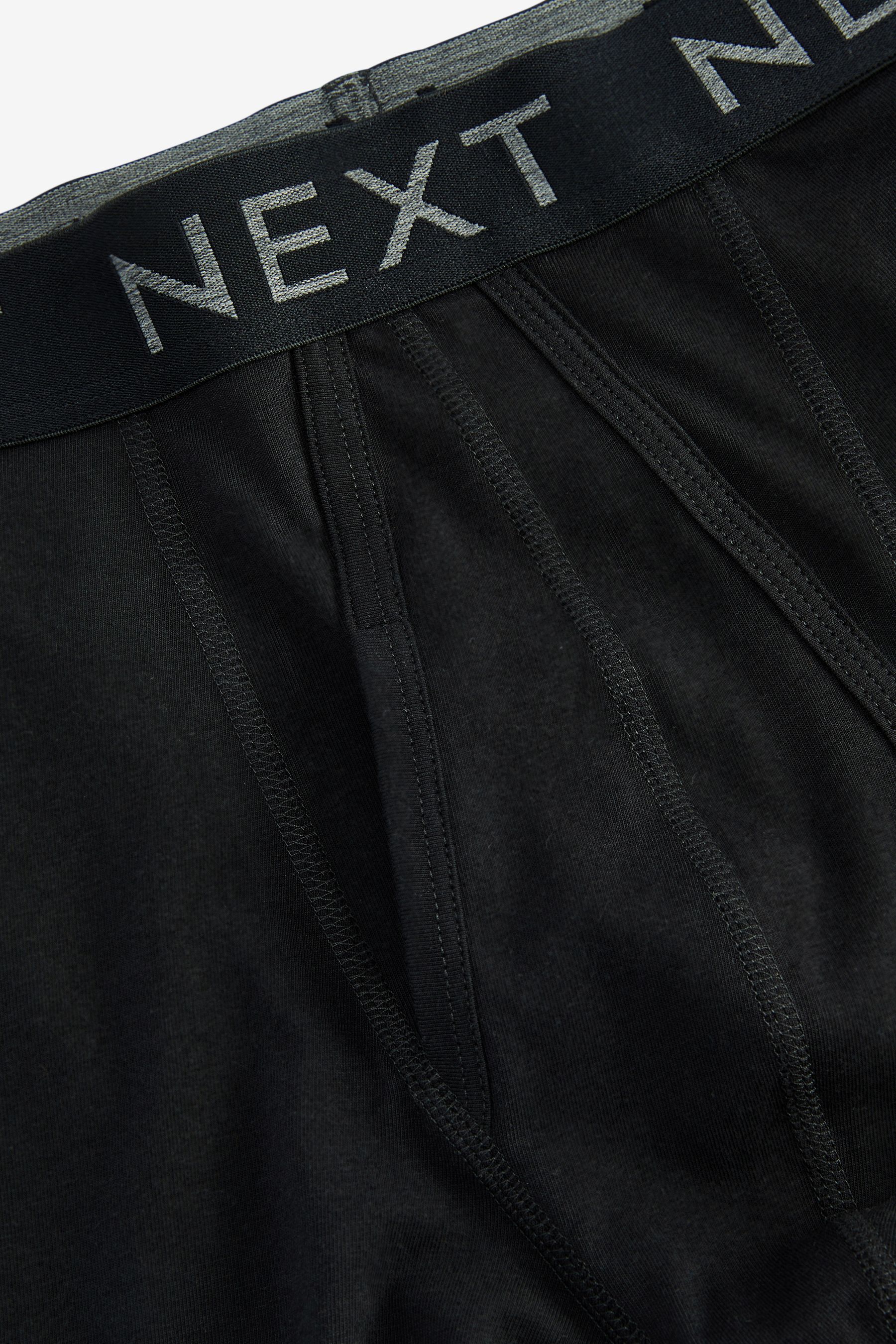 Buy Black 4 pack Sports Longer Length A-Fronts Boxers from the Next UK ...
