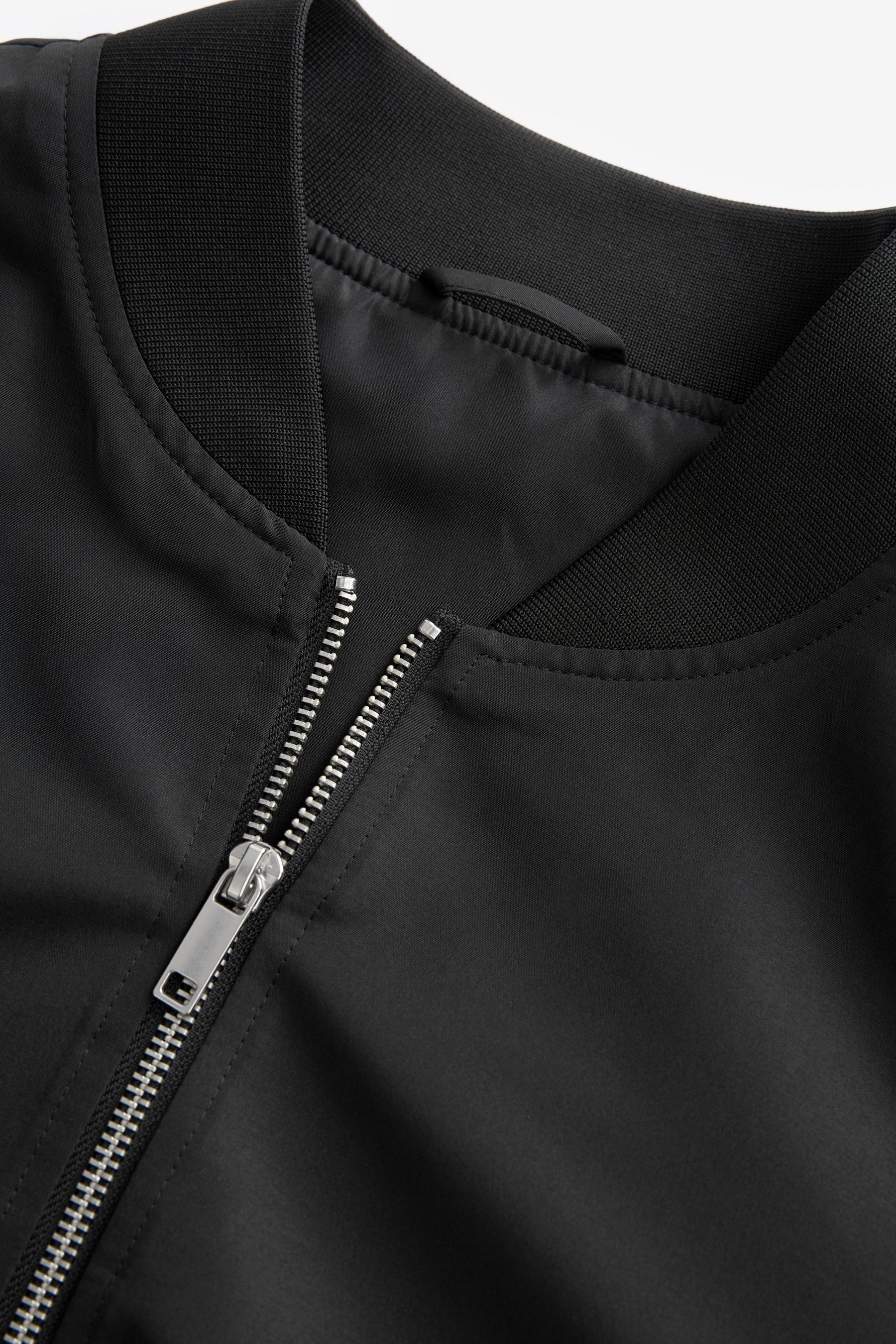 Buy Black Shower Resistant Bomber Jacket from the Next UK online shop