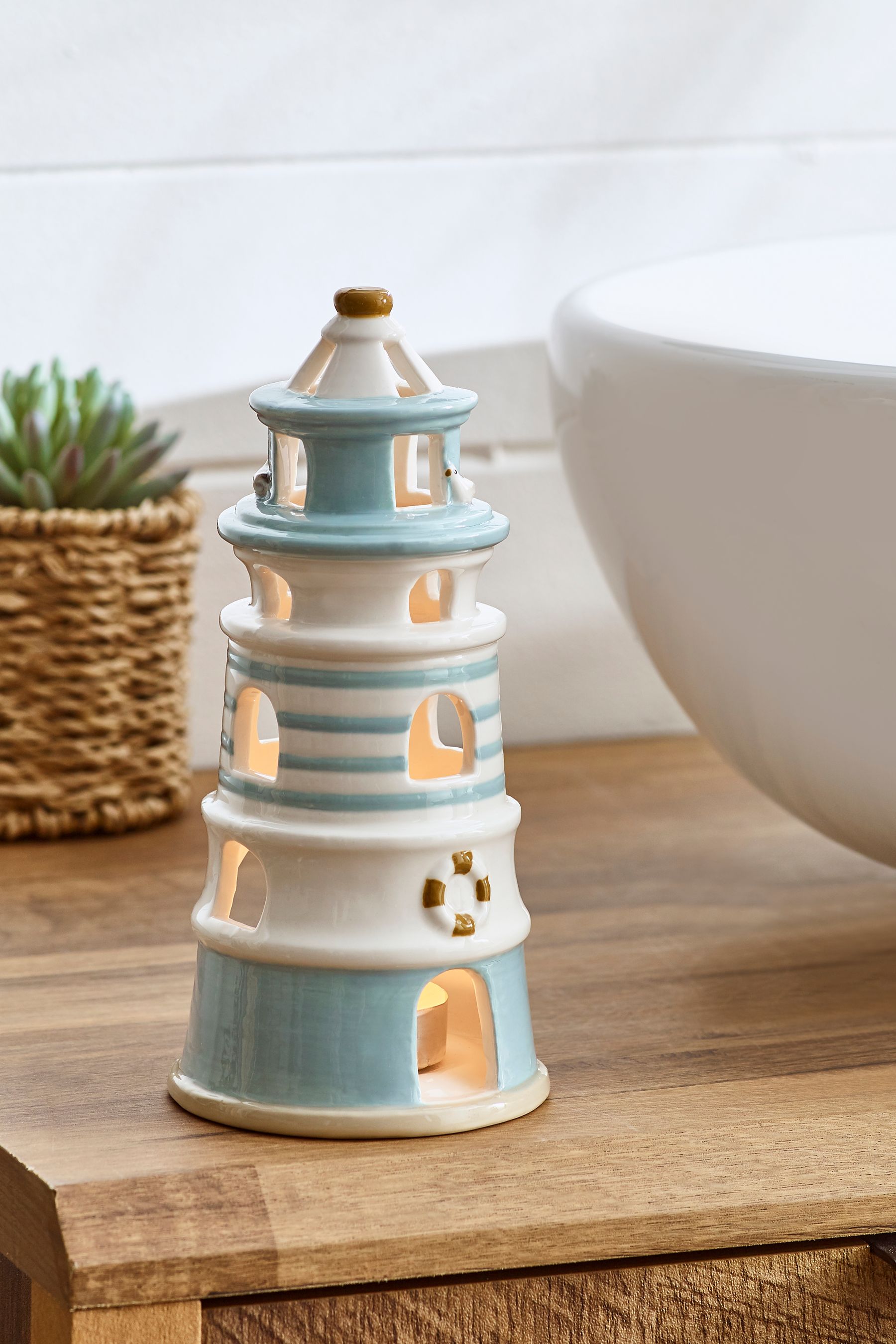 Buy Blue Seaside Lighthouse Tealight Holder from the Next UK online shop