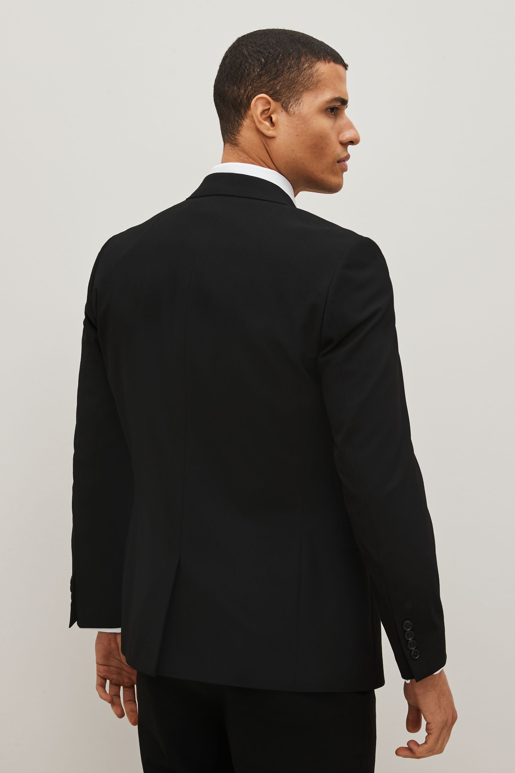 Buy Black Slim Fit Motionflex Stretch Suit Jacket from the Next UK ...