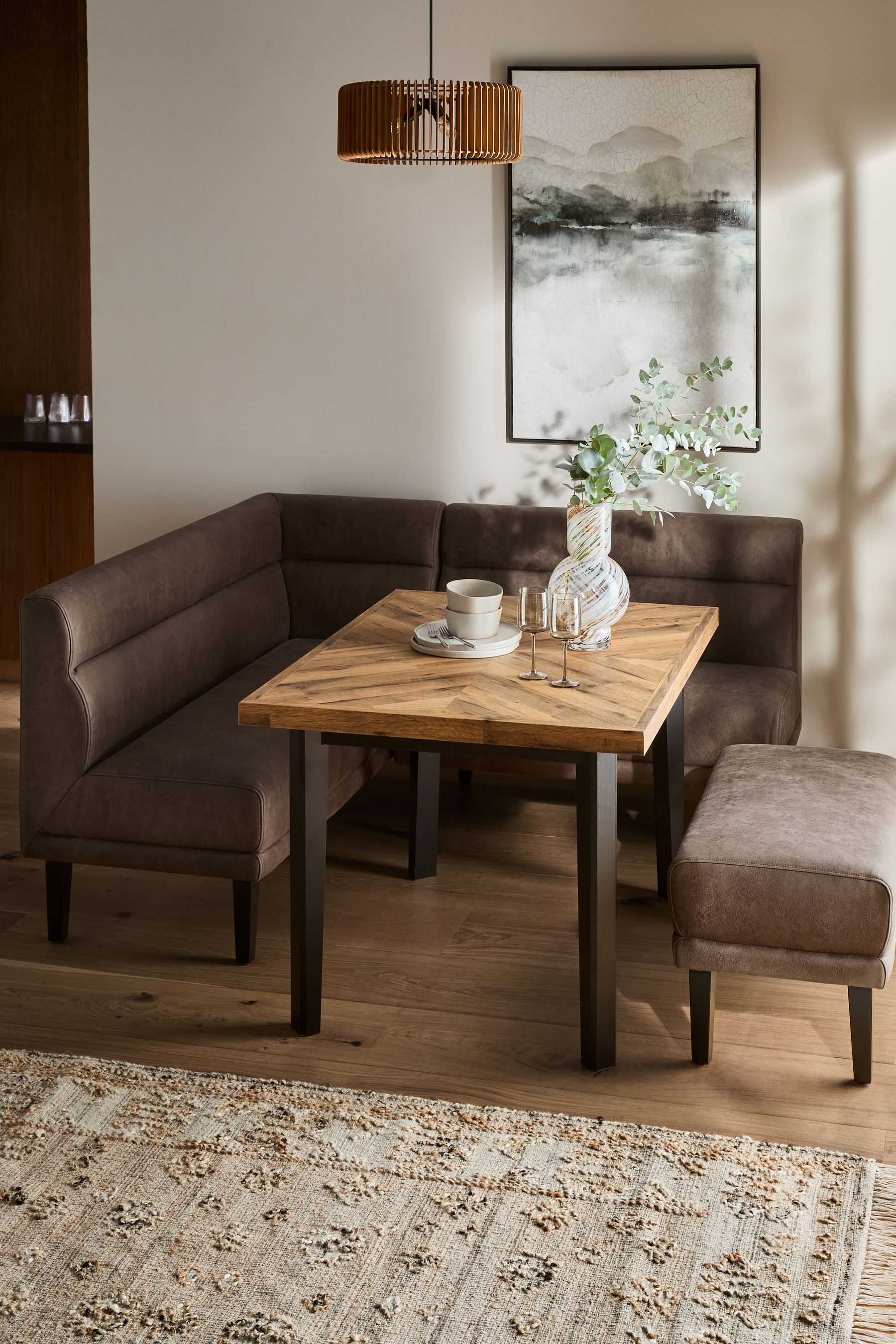 Buy Monza Faux Leather Peppercorn Brown Bronx 6 Seater Dining Table and Corner Bench Set from the AspennigeriaShops online shop