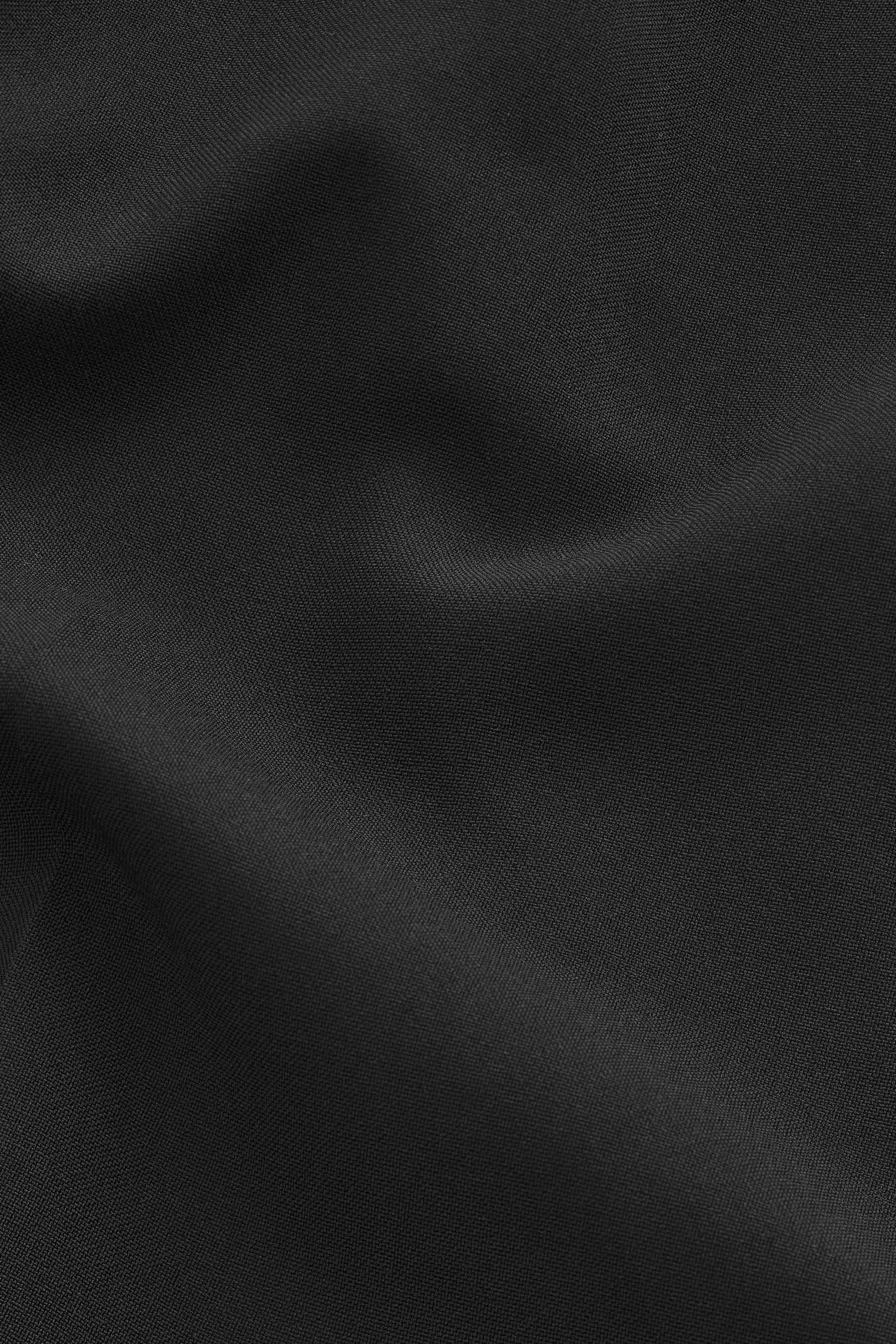 Buy Black Slim Machine Washable Plain Front Smart Trousers from the ...