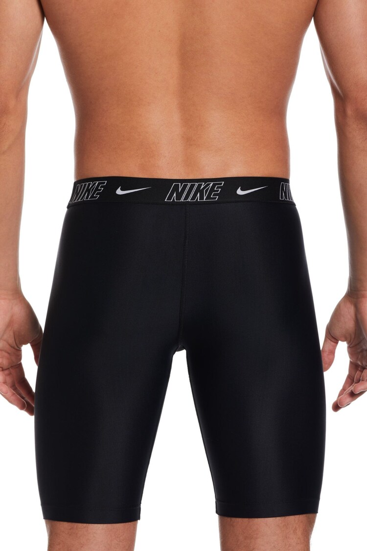 Buy Nike Black Logo Tape Jammer Performance Swim Shorts from the Next ...