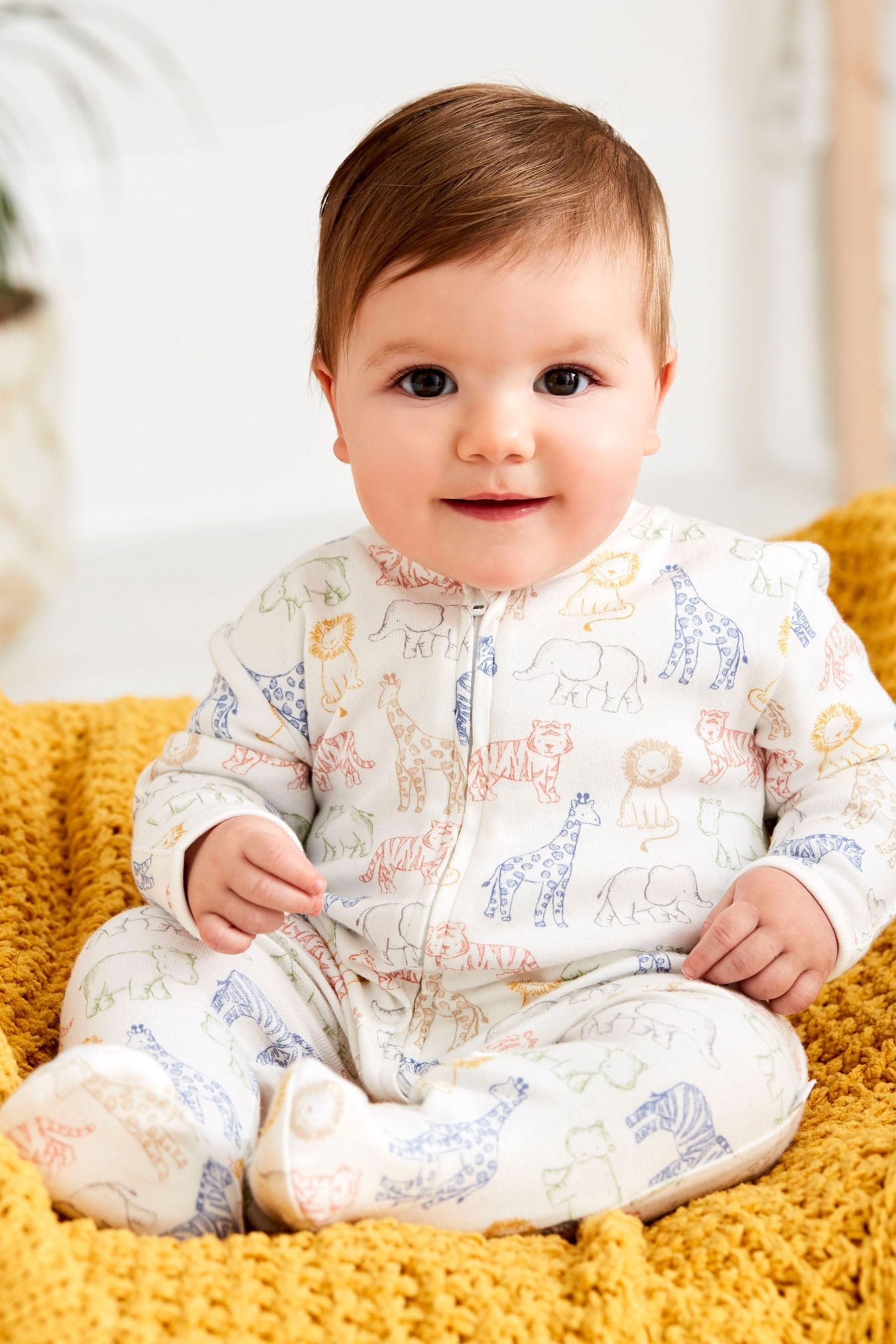 Buy JoJo Maman Bébé Cream Safari Print Zip Cotton Baby Sleepsuit from ...