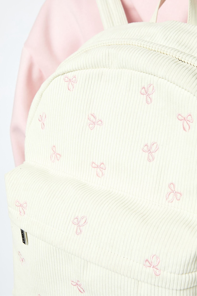 Buy Skinnydip White Bow Embroidered Backpack from the Next UK online shop