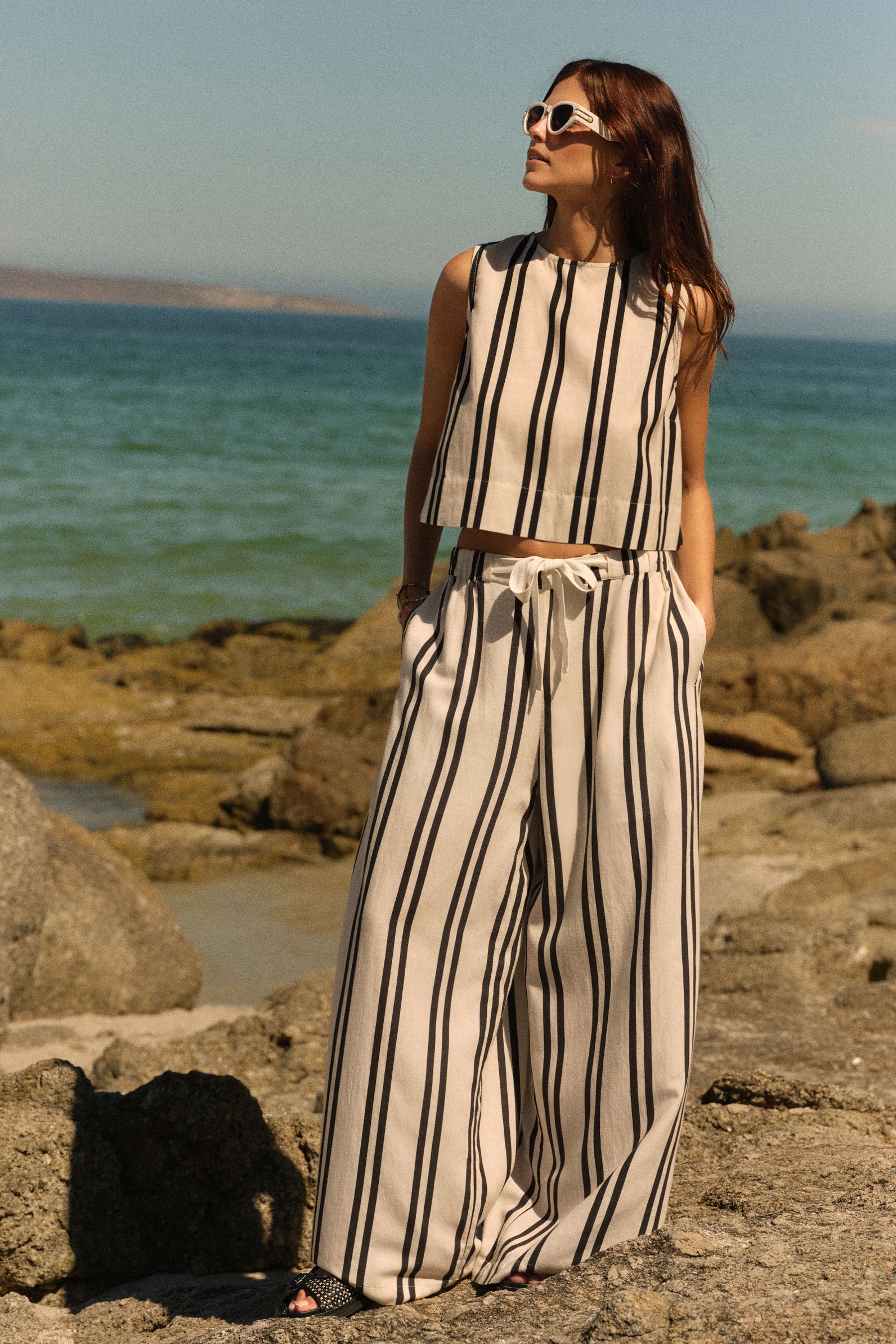 Buy White/Black Stripe Sleeveless Shell Top from the Next UK online shop