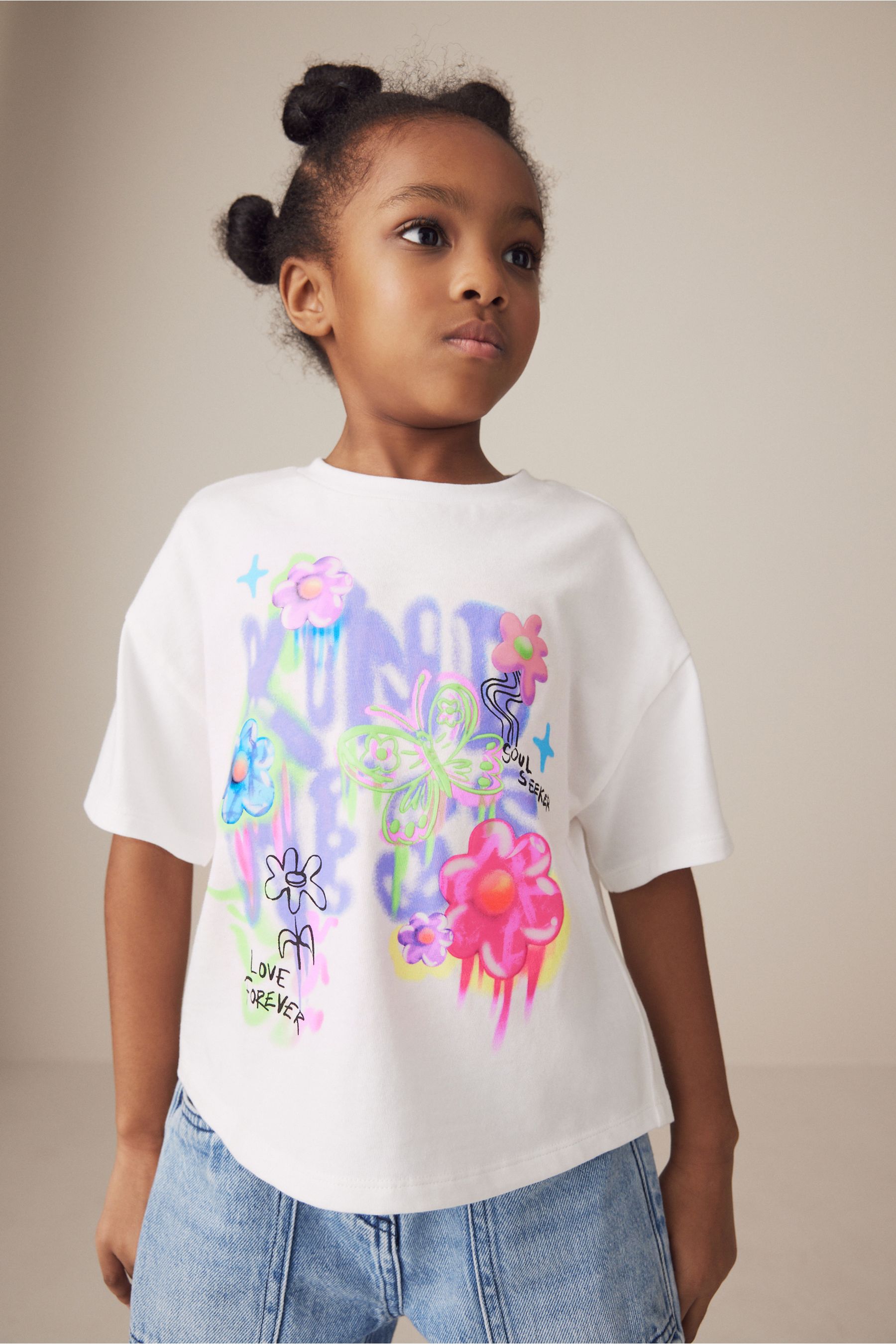 Buy White 100% Cotton Graffiti Butterfly Graphic T-Shirt (3-16yrs) from ... Buy White 100% Cotton Graffiti Butterfly Graphic T-Shirt (3-16yrs) from ...