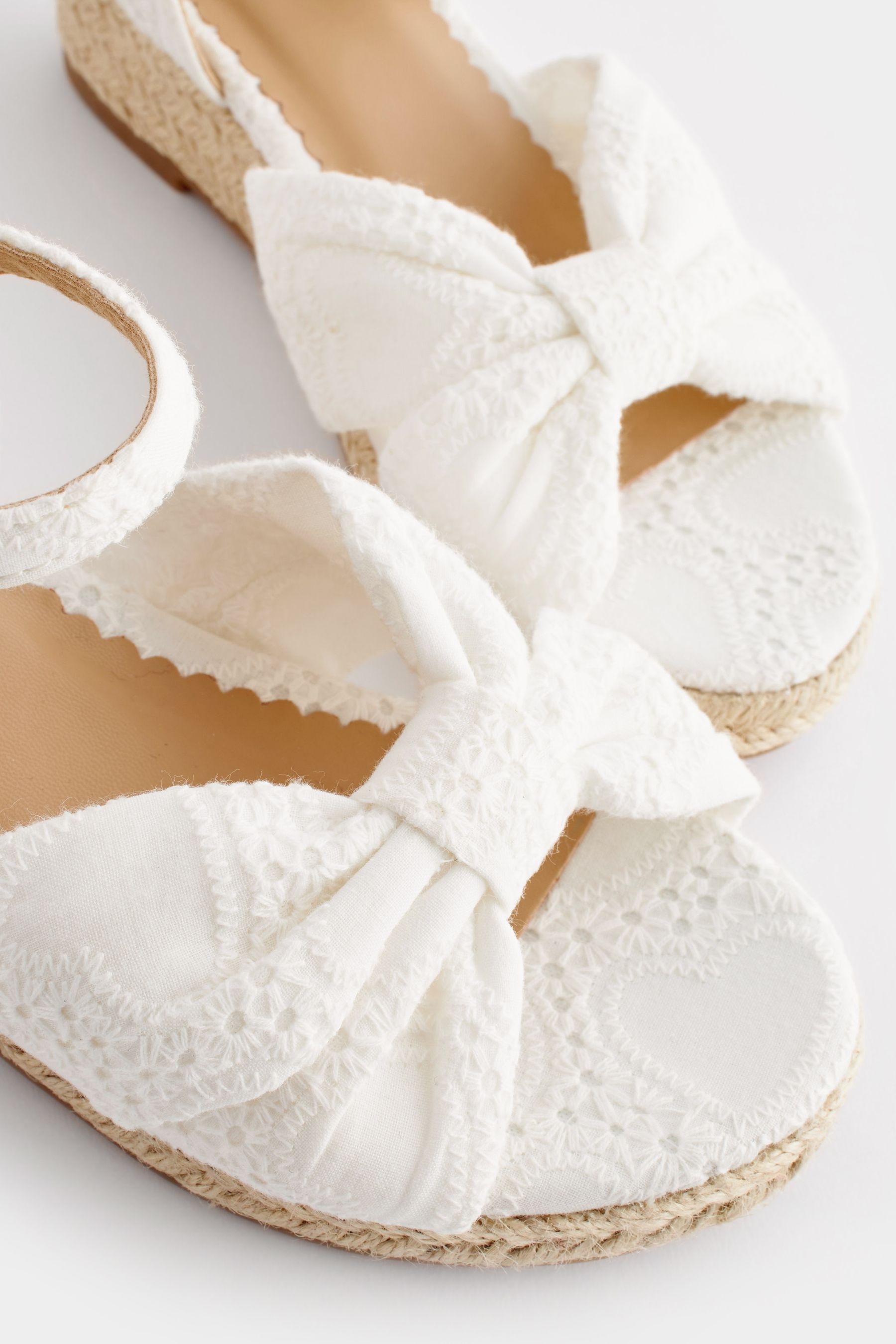 Buy White Broderie Bow Wedge Sandals from the Next UK online shop