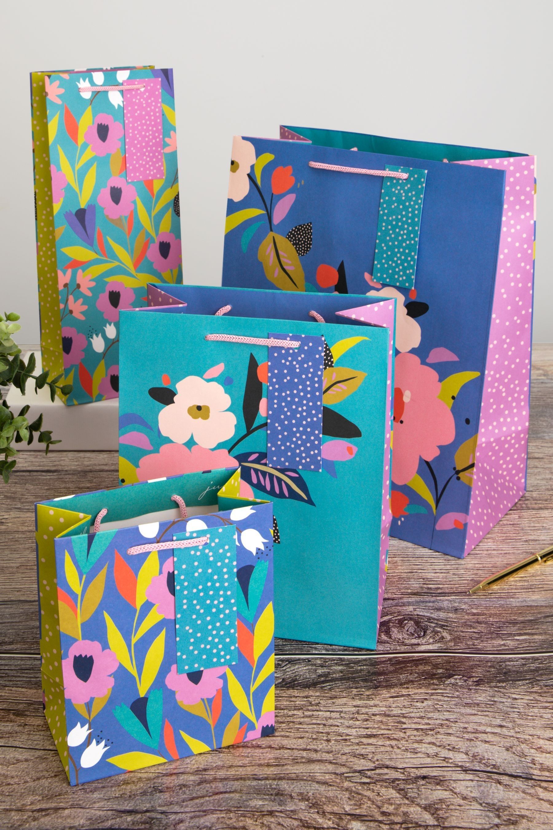 Buy Hallmark Blue Set of 4 Gift Bags In Floral Designs from the Next UK ...