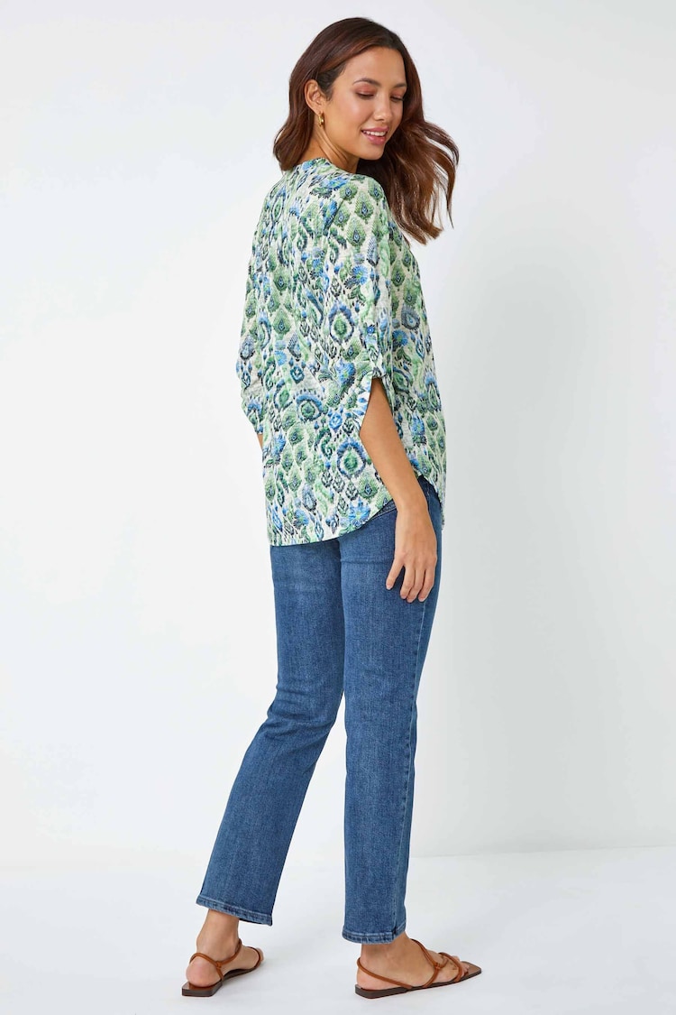 Buy Roman Green Roman Patterned Burnout Print Relaxed Top from the Next ...