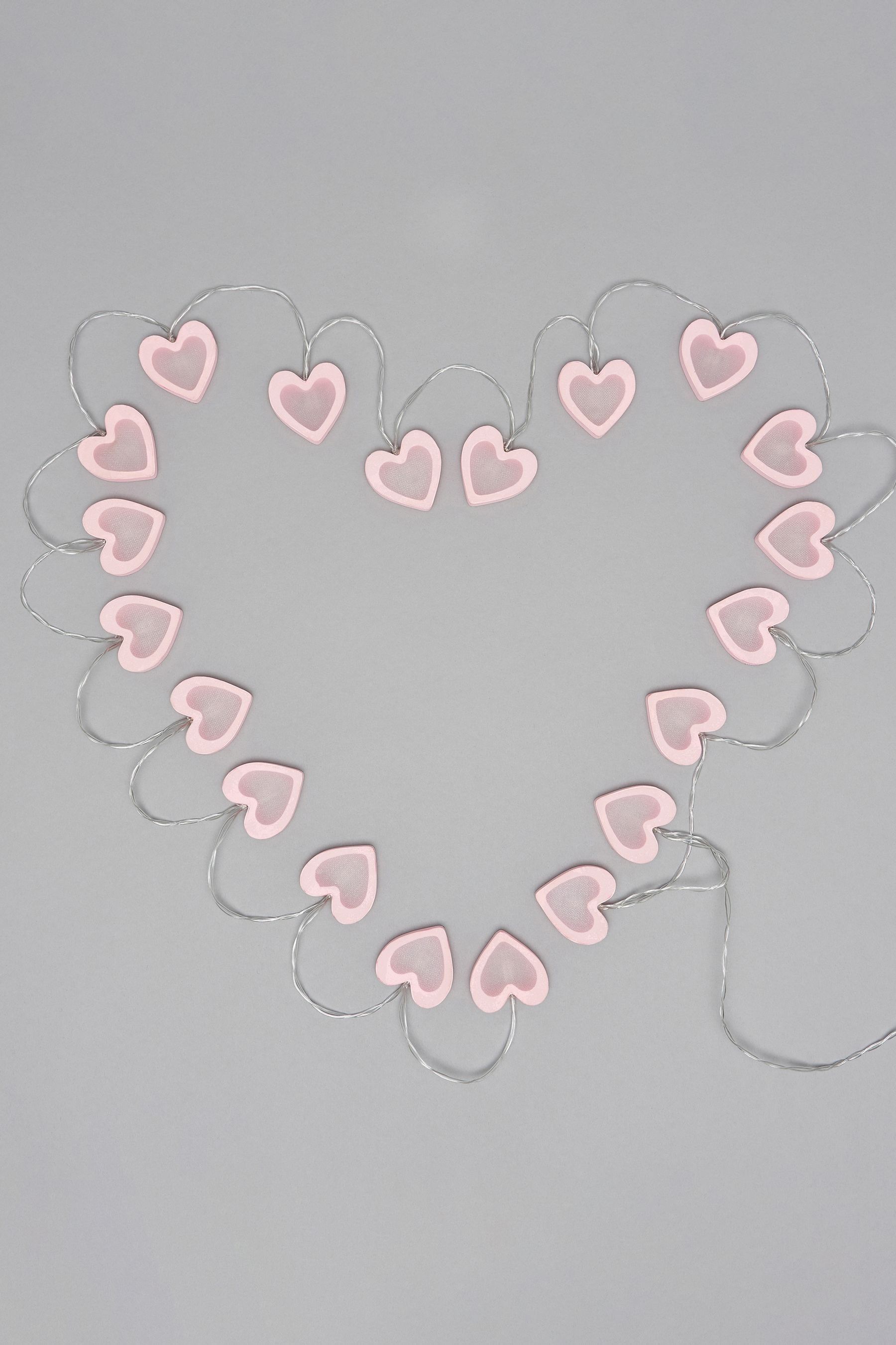 Buy glow Pink Love Heart Wood String Lights from the Next UK online shop