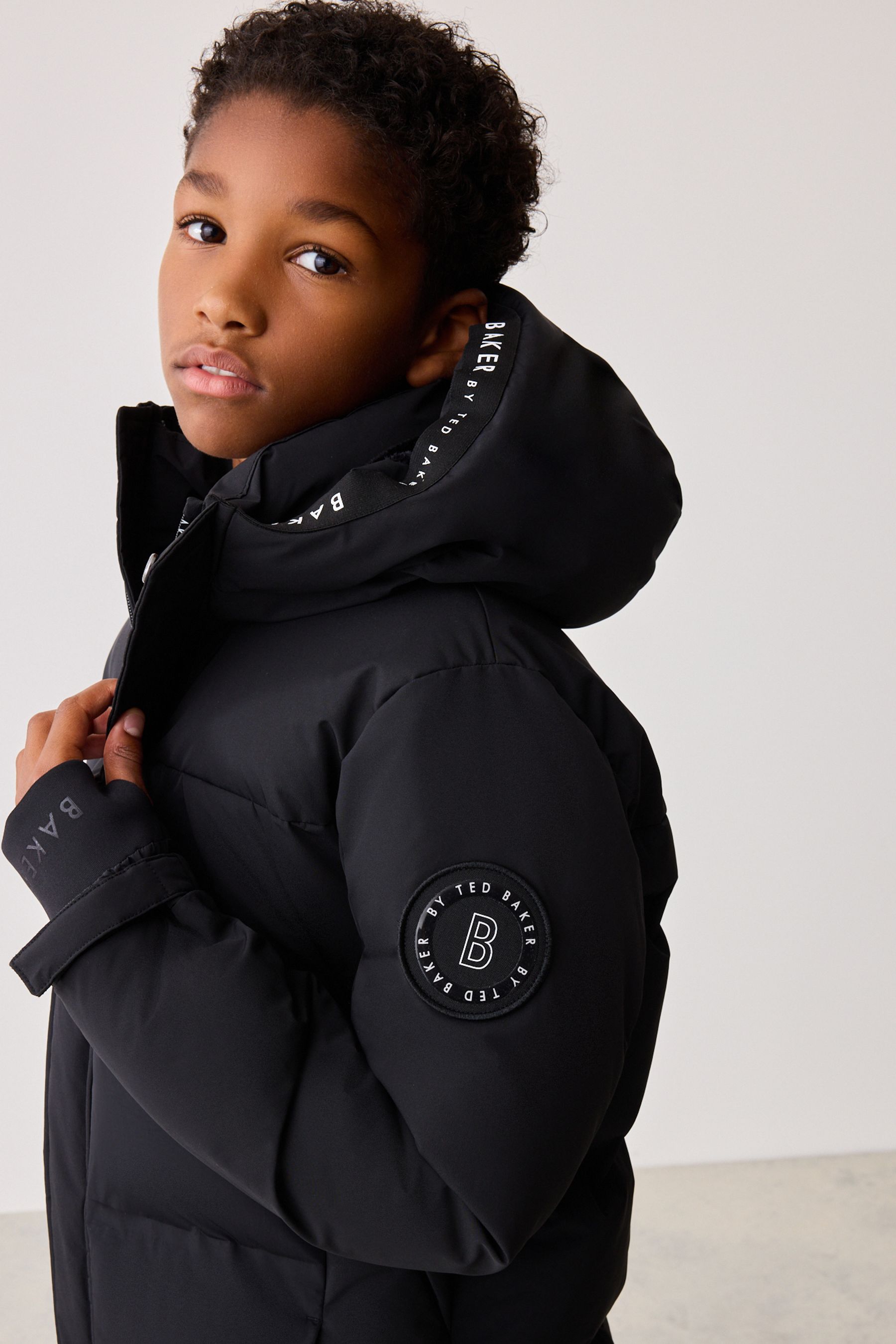 Buy Baker by Ted Baker Shower Resistant Longline Padded Black Coat from ...