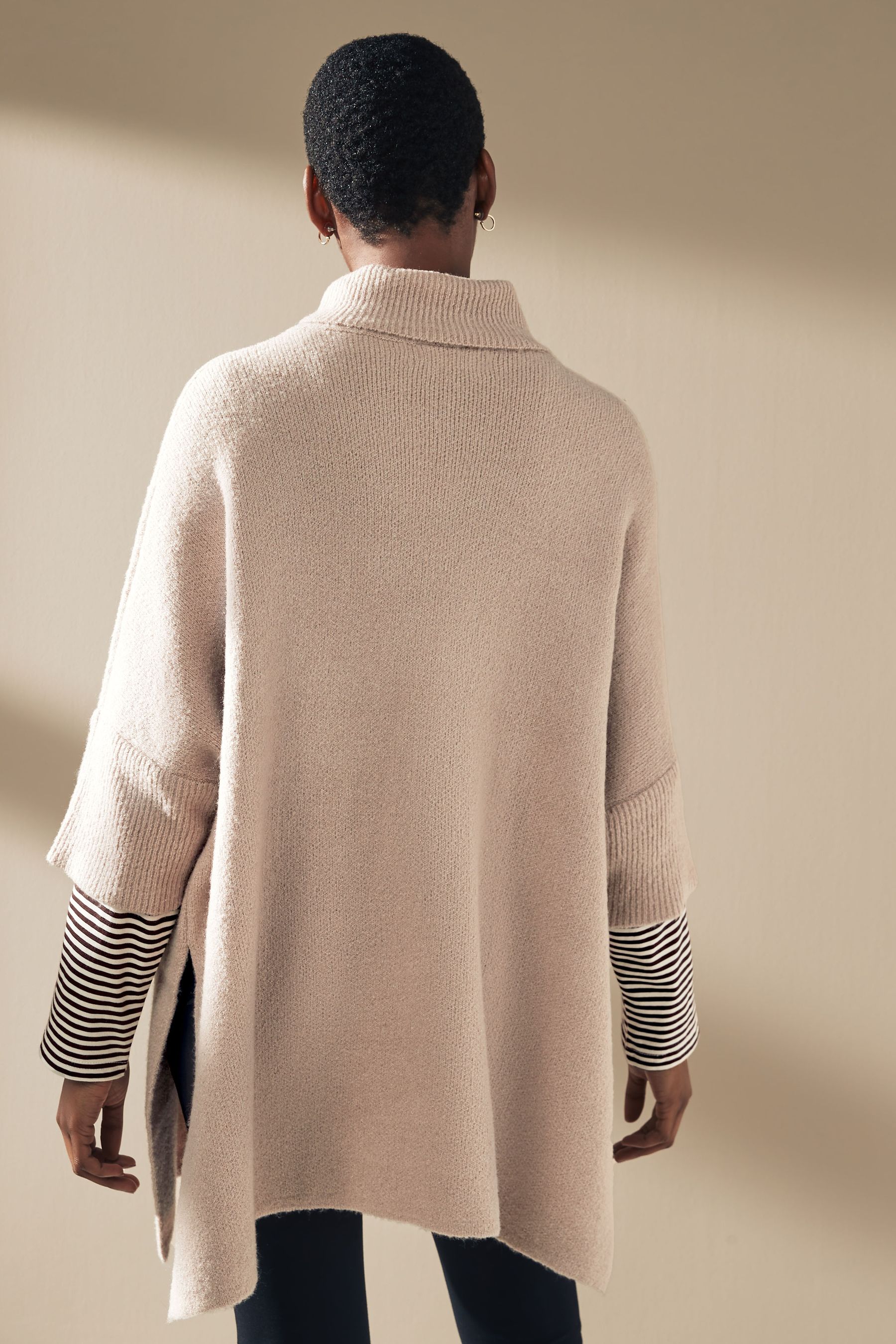 Buy Oatmeal Knitted Poncho with Stripe Sleeve from the Next UK online shop