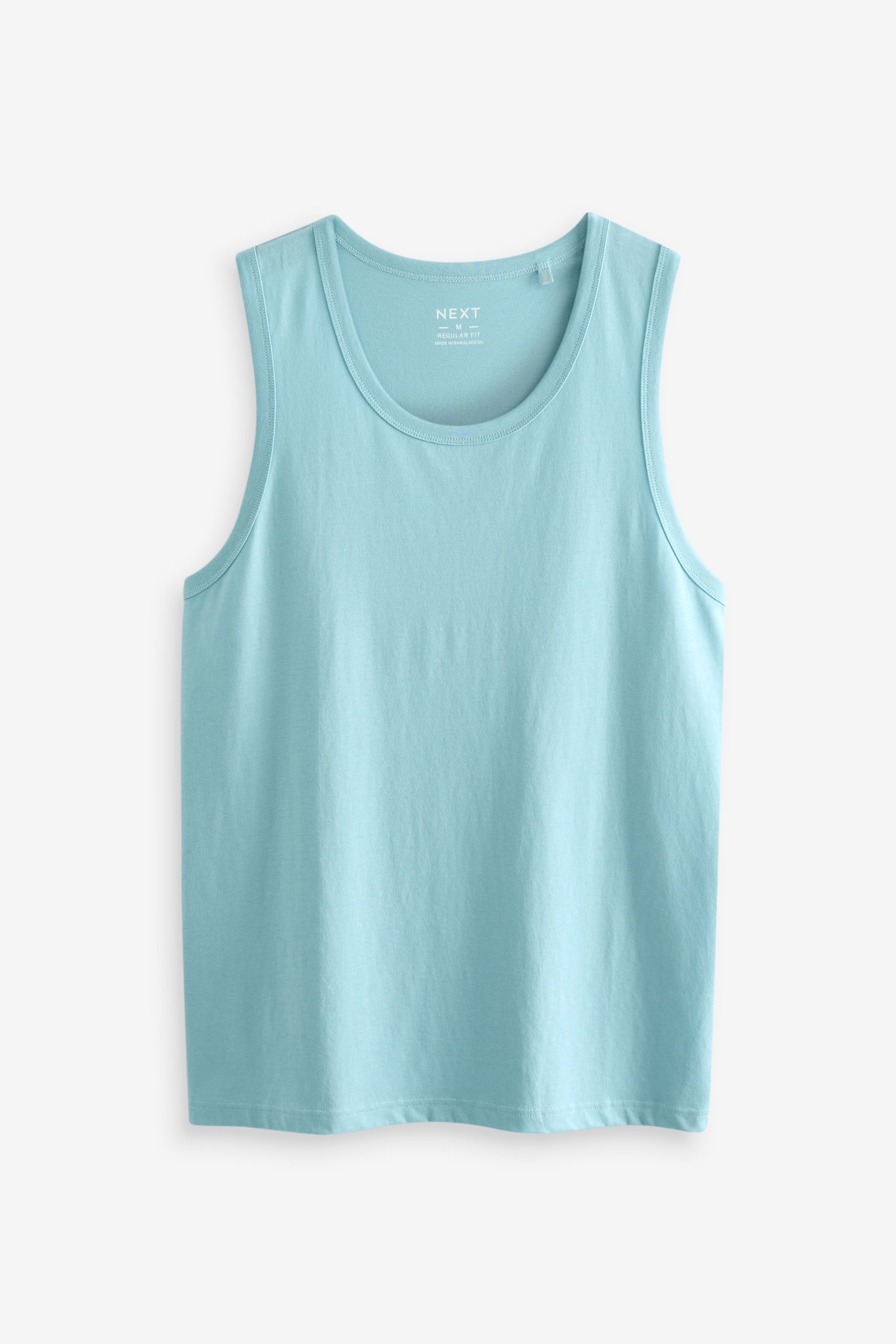 Buy Black/Navy/White/Blue 100% Cotton Vests 4 Pack from the Next UK ...