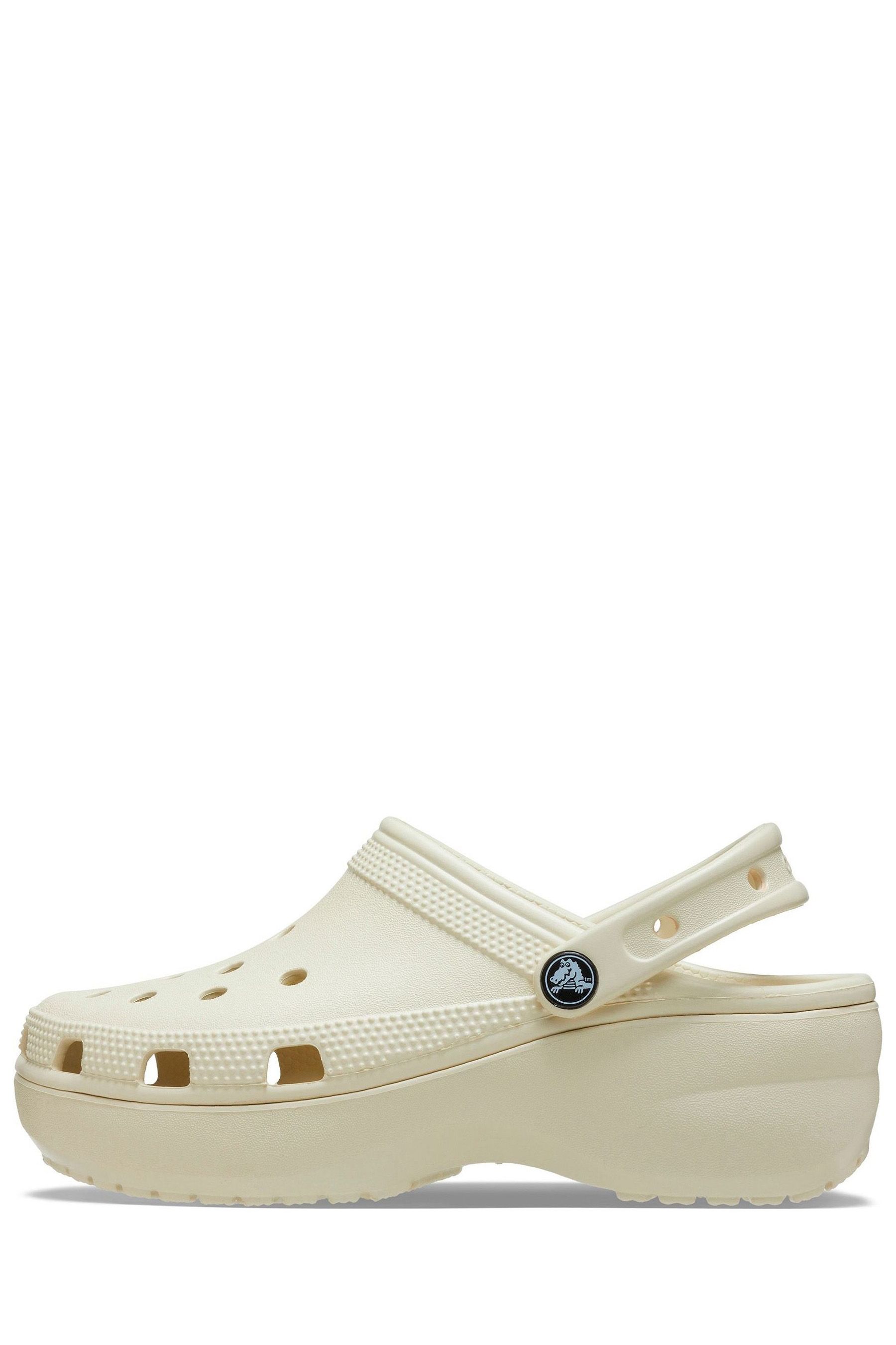 Buy Crocs Light Cream Classic Platform Clogs from the Next UK online shop
