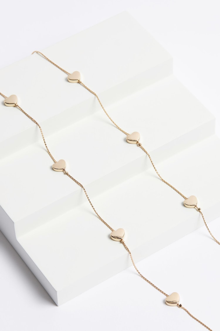 Buy Gold Tone Heart Long Rope Necklace from the Next UK online shop