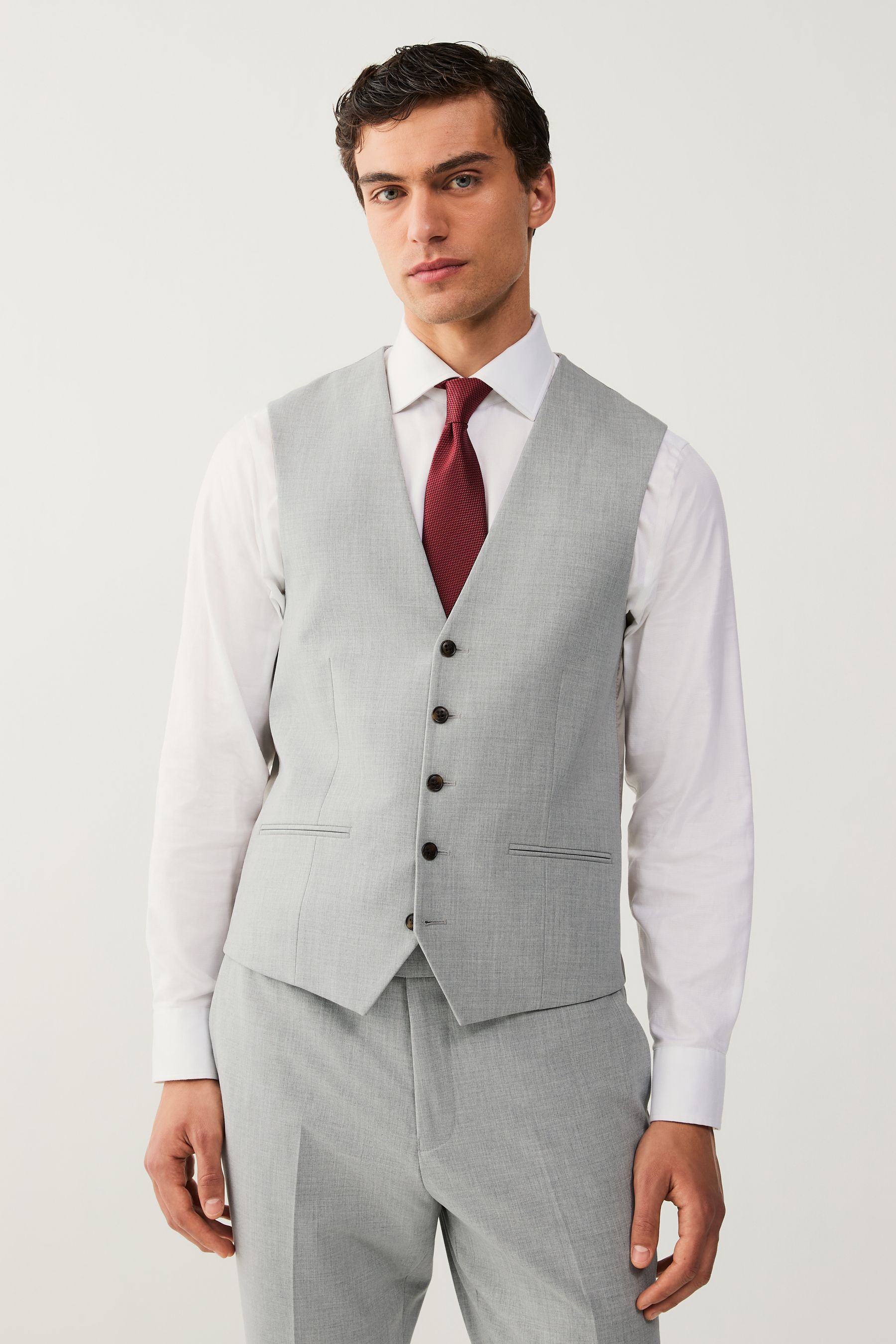 Buy Light Grey Regular Fit Motionflex Stretch Waistcoat from the Next ...