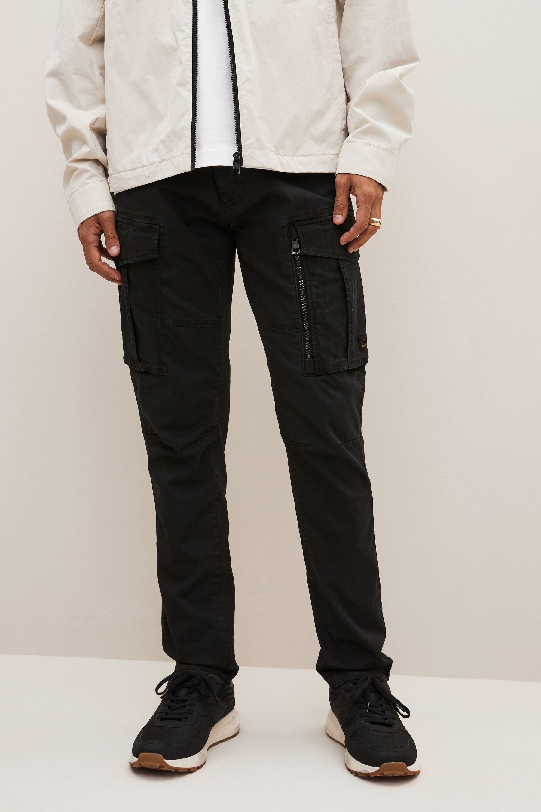 Buy Black Slim Fit Zip Detail Stretch Cargo Trousers from the Next UK ...
